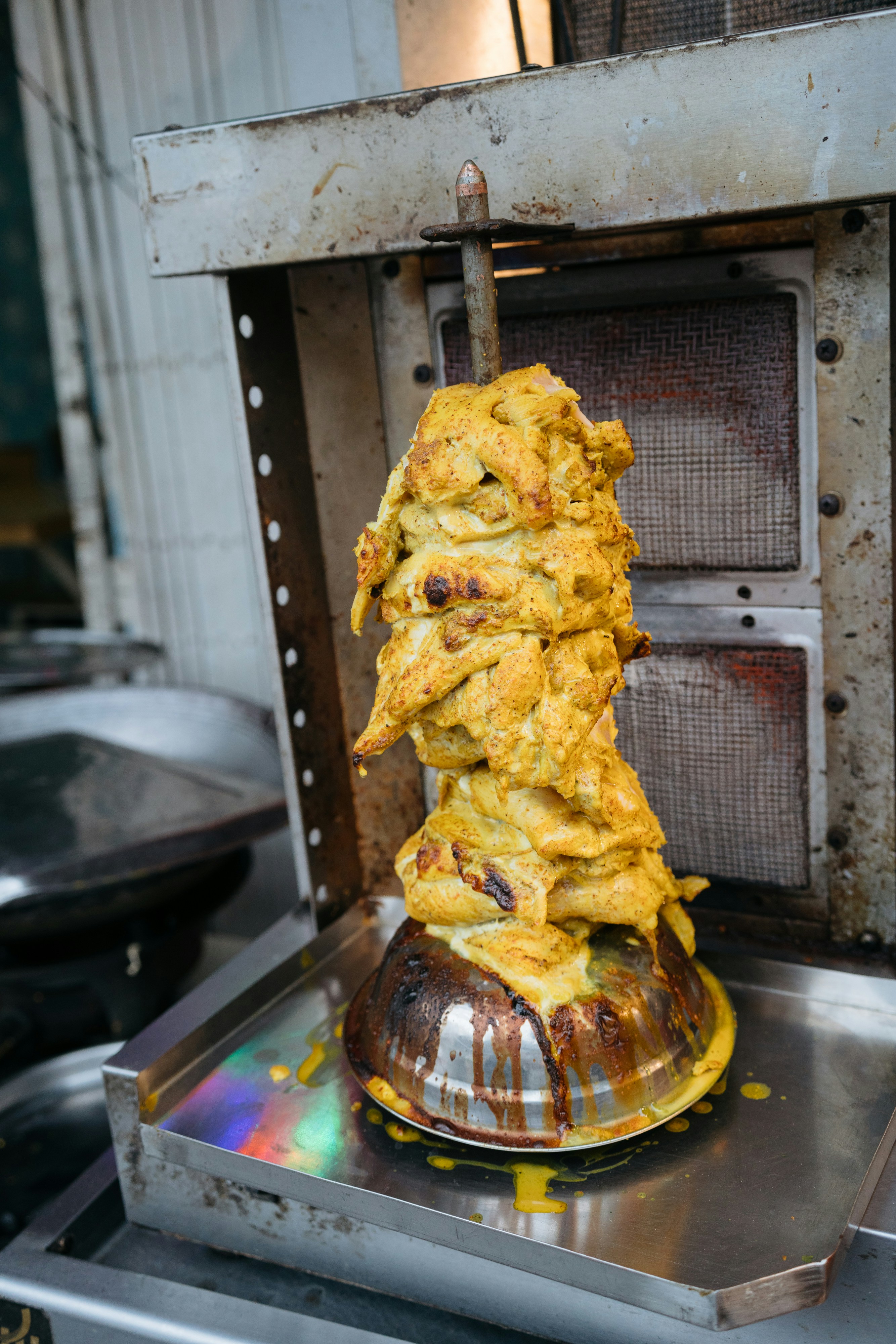 Chicken shawarma roasting on a vertical spit. photo – Free Food Image ...