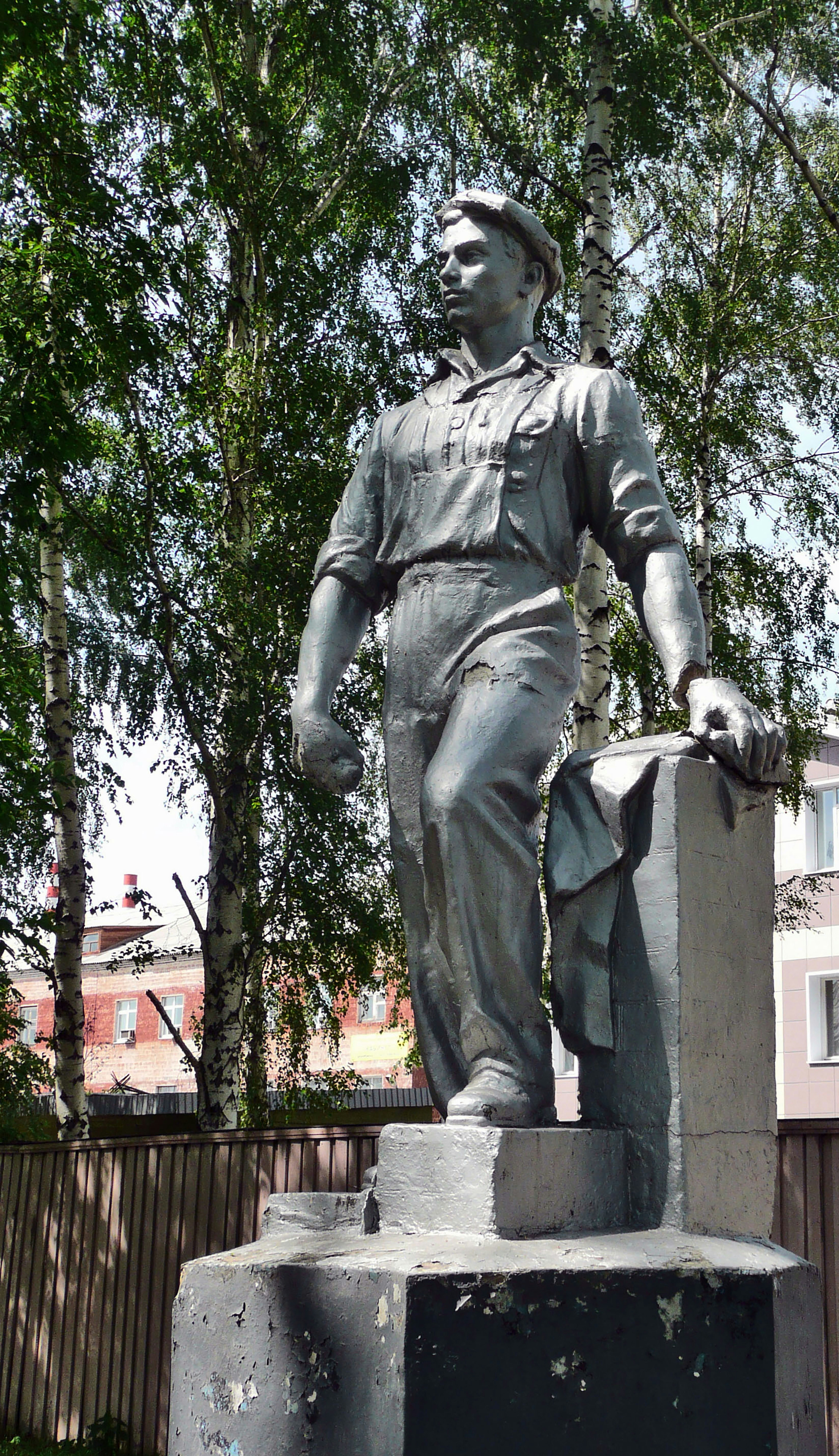 A statue depicts a worker standing proudly. photo – Free Art Image on ...