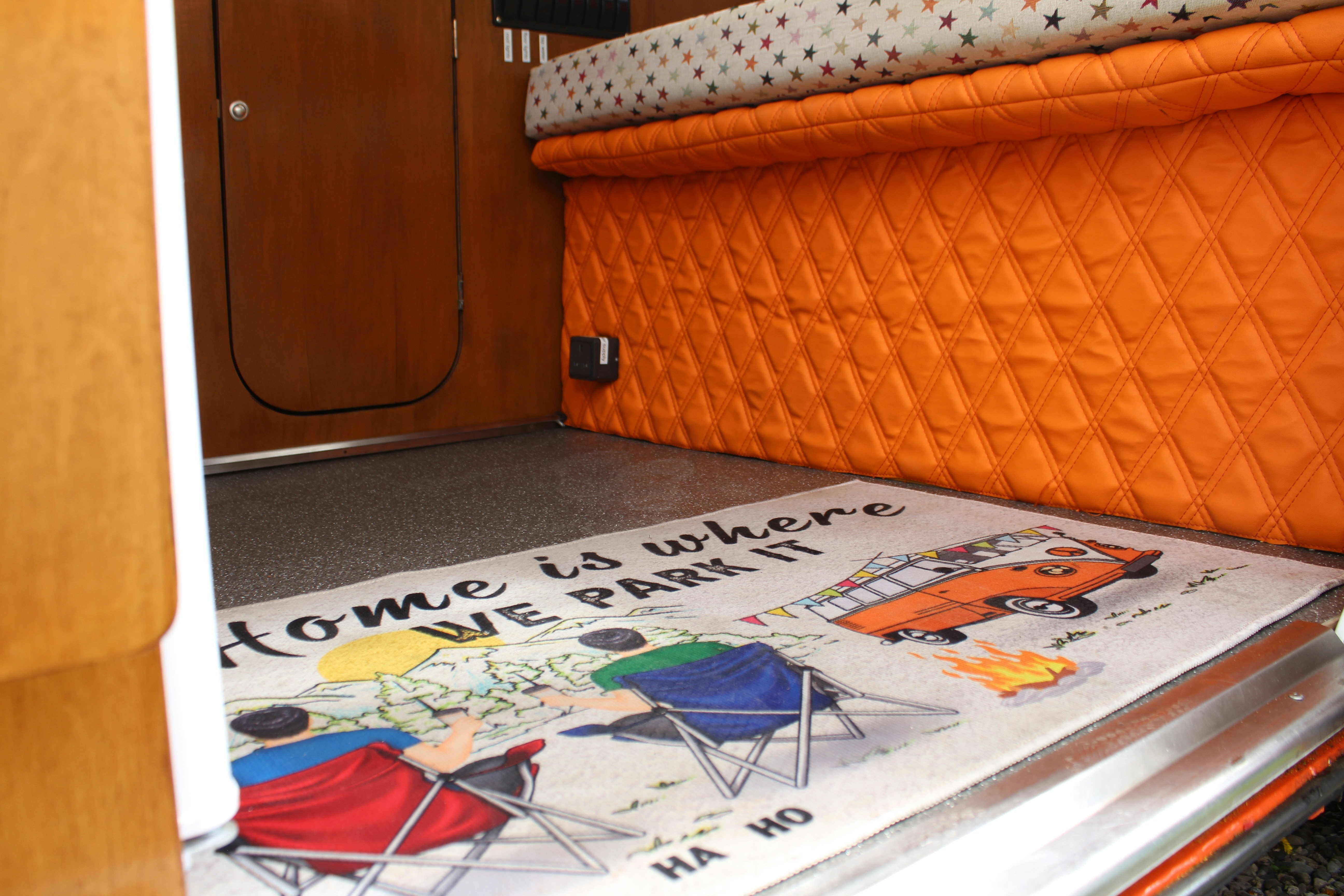 Cozy Camper Entrance with Vintage Rug Welcome