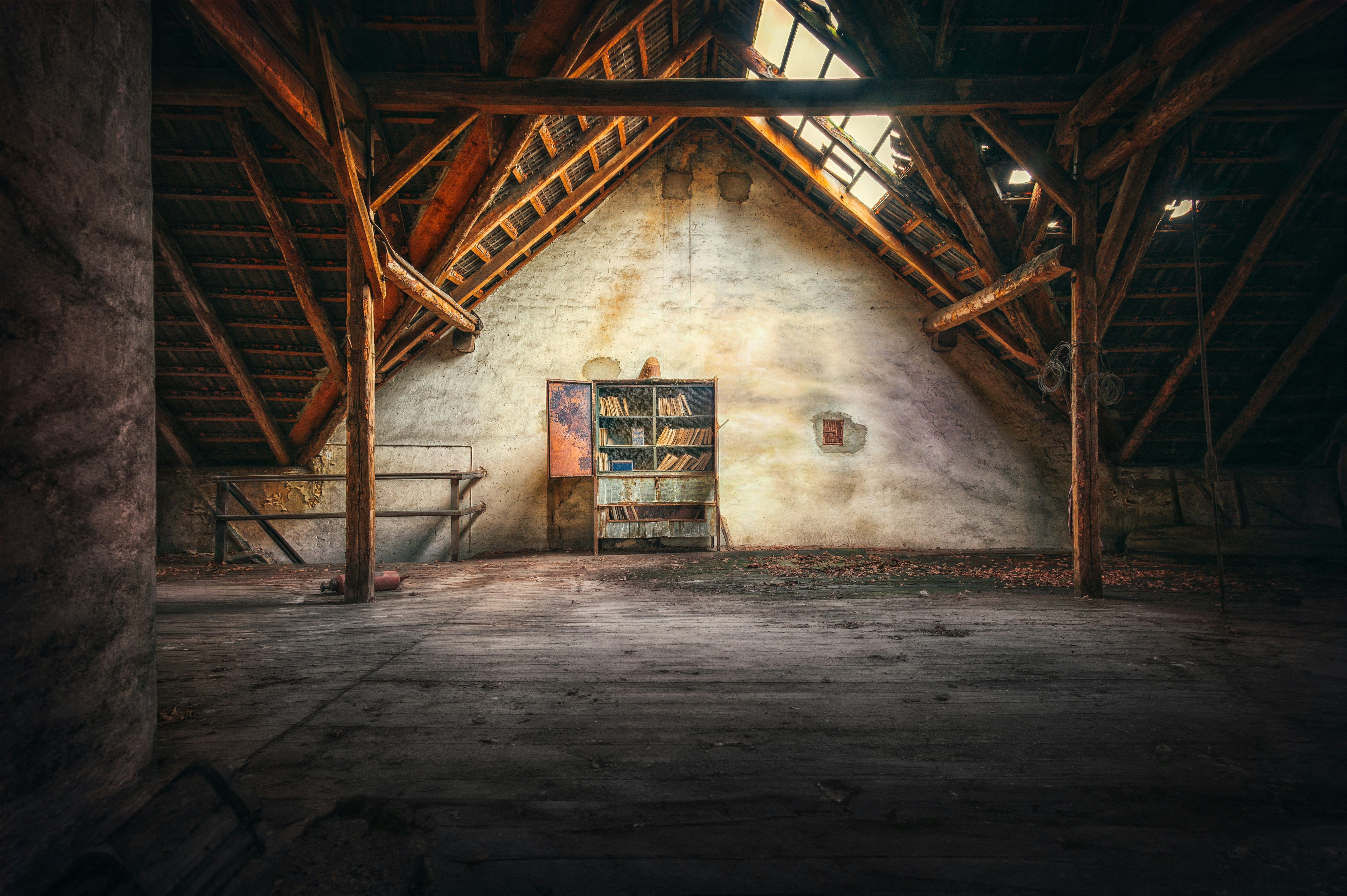 An empty attic with a bookshelf inside. photo – Free Books Image on ...