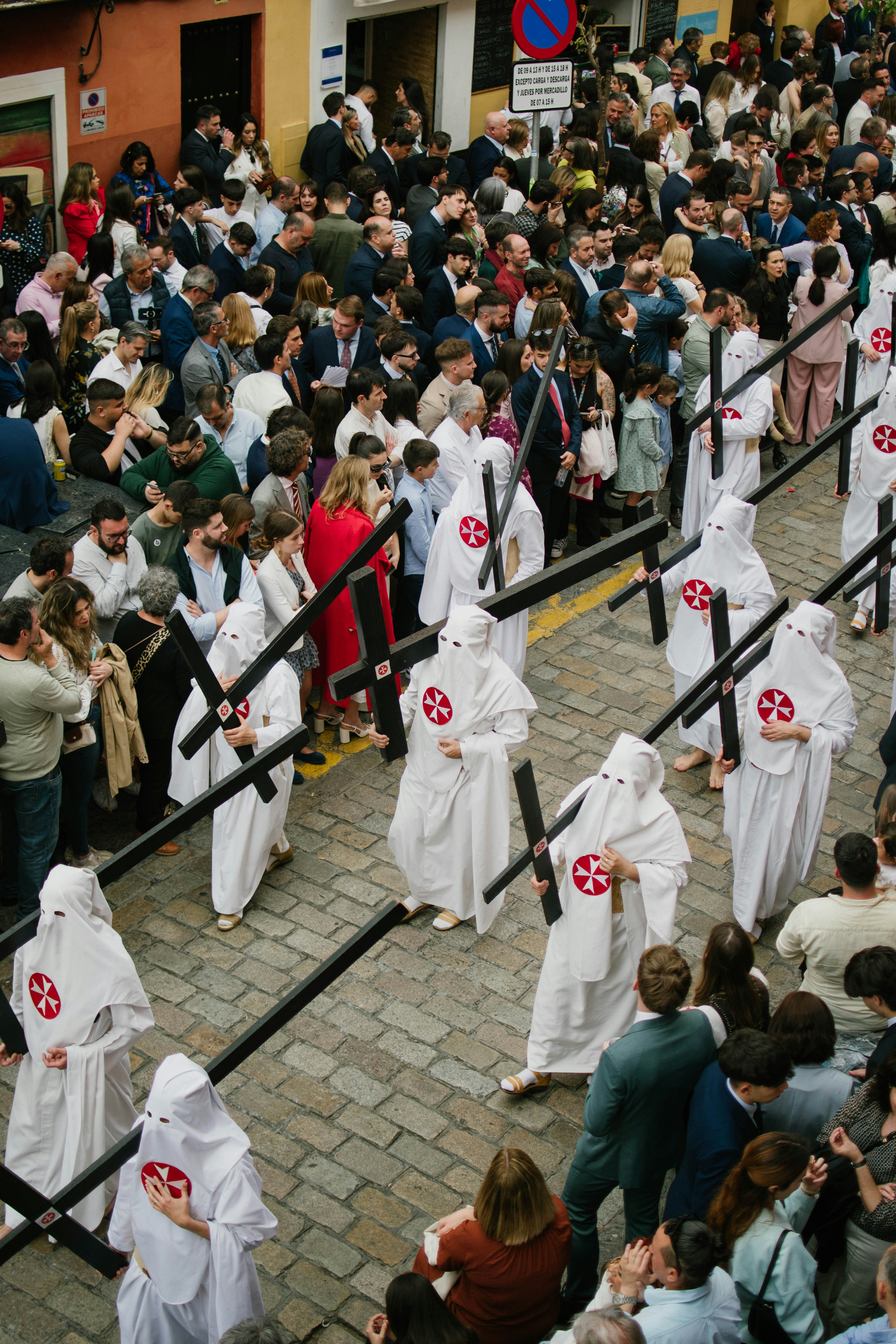 People in robes march in a religious procession. photo – Free Spain ...