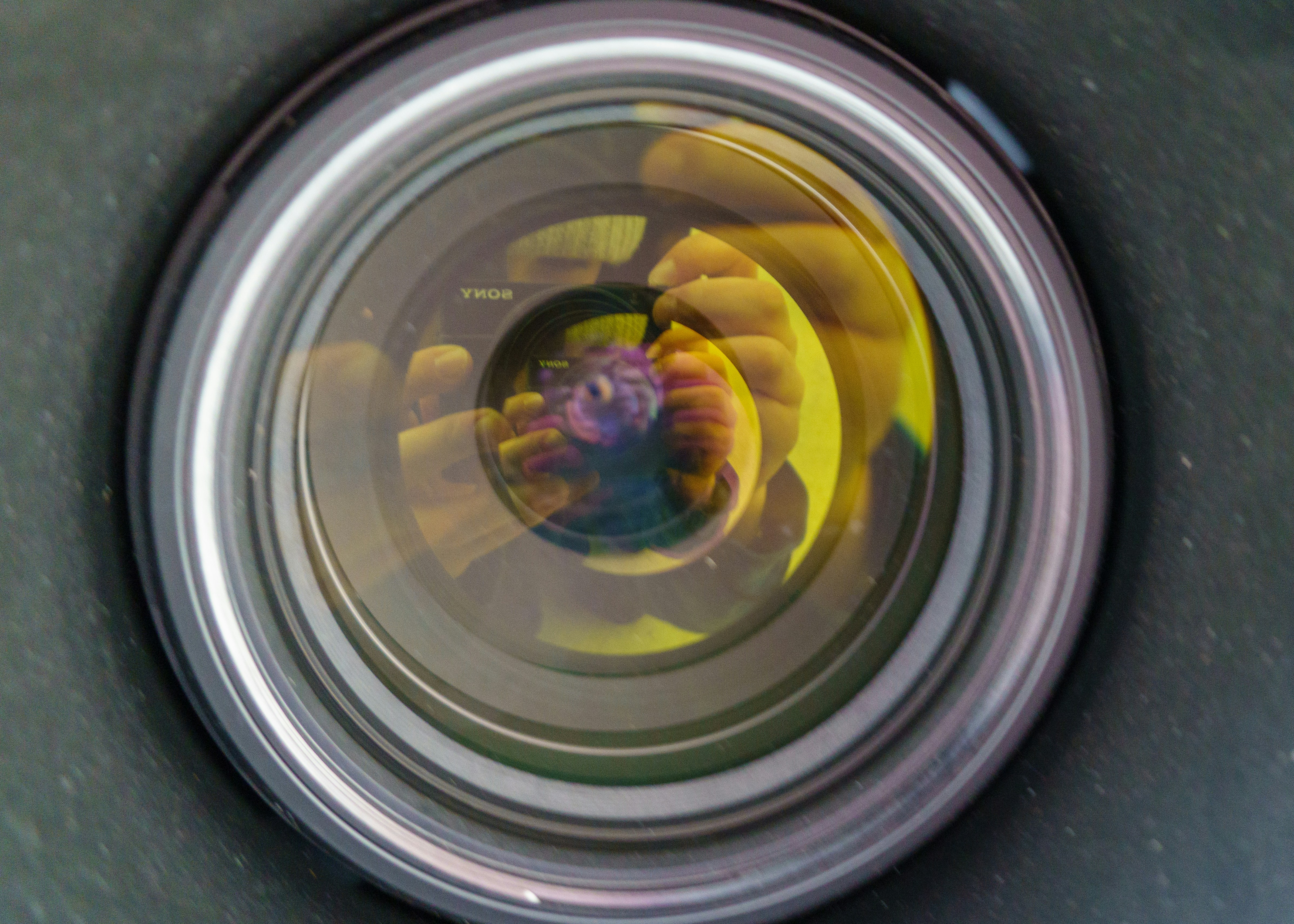 Close-up of a camera lens reflecting light. photo – Free Color Image on ...