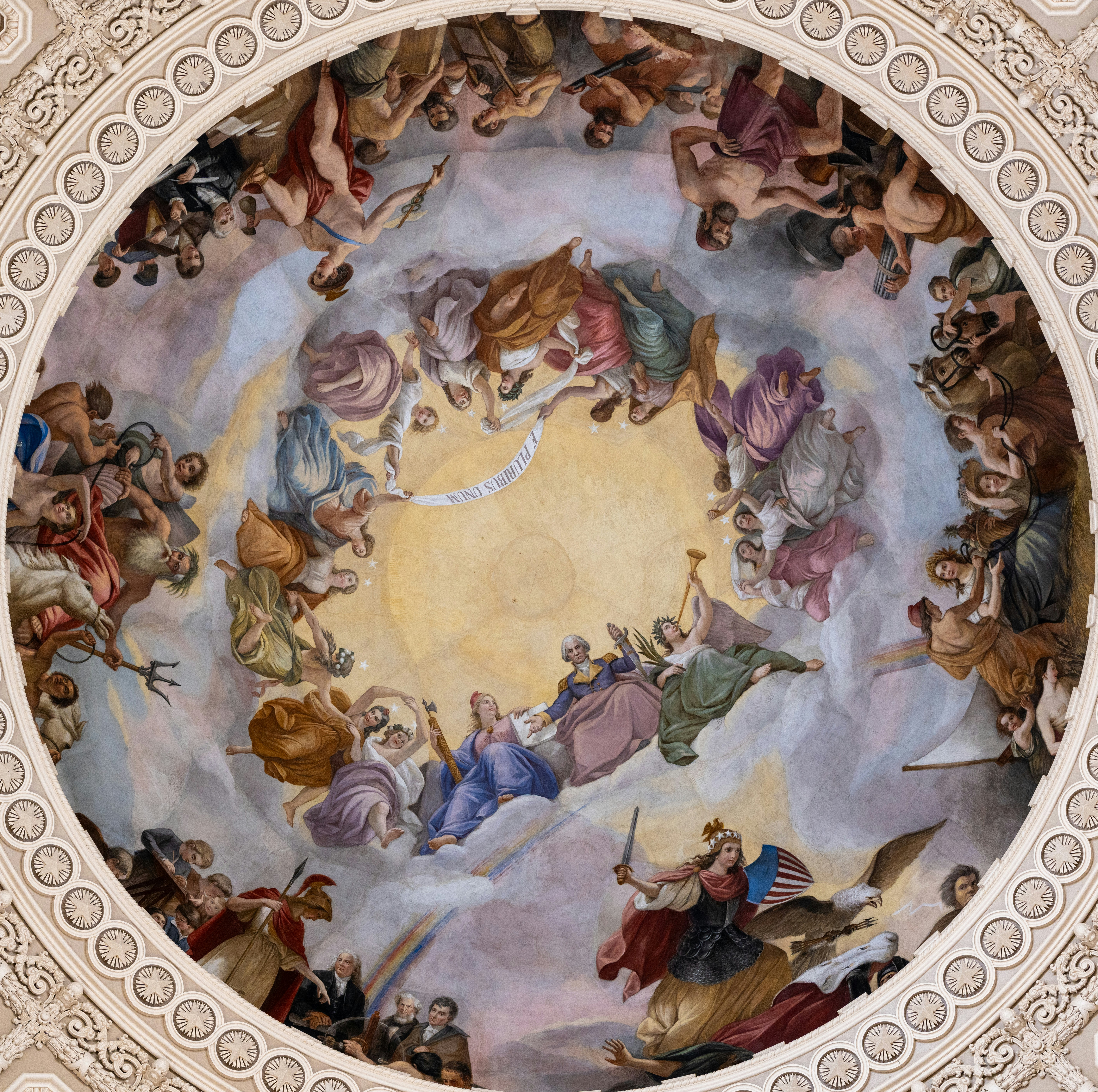 Intricate fresco depicting a circular arrangement of mythological figures and deities, showcasing their interaction and significance. The artwork emphasizes the grandeur of the scene.
