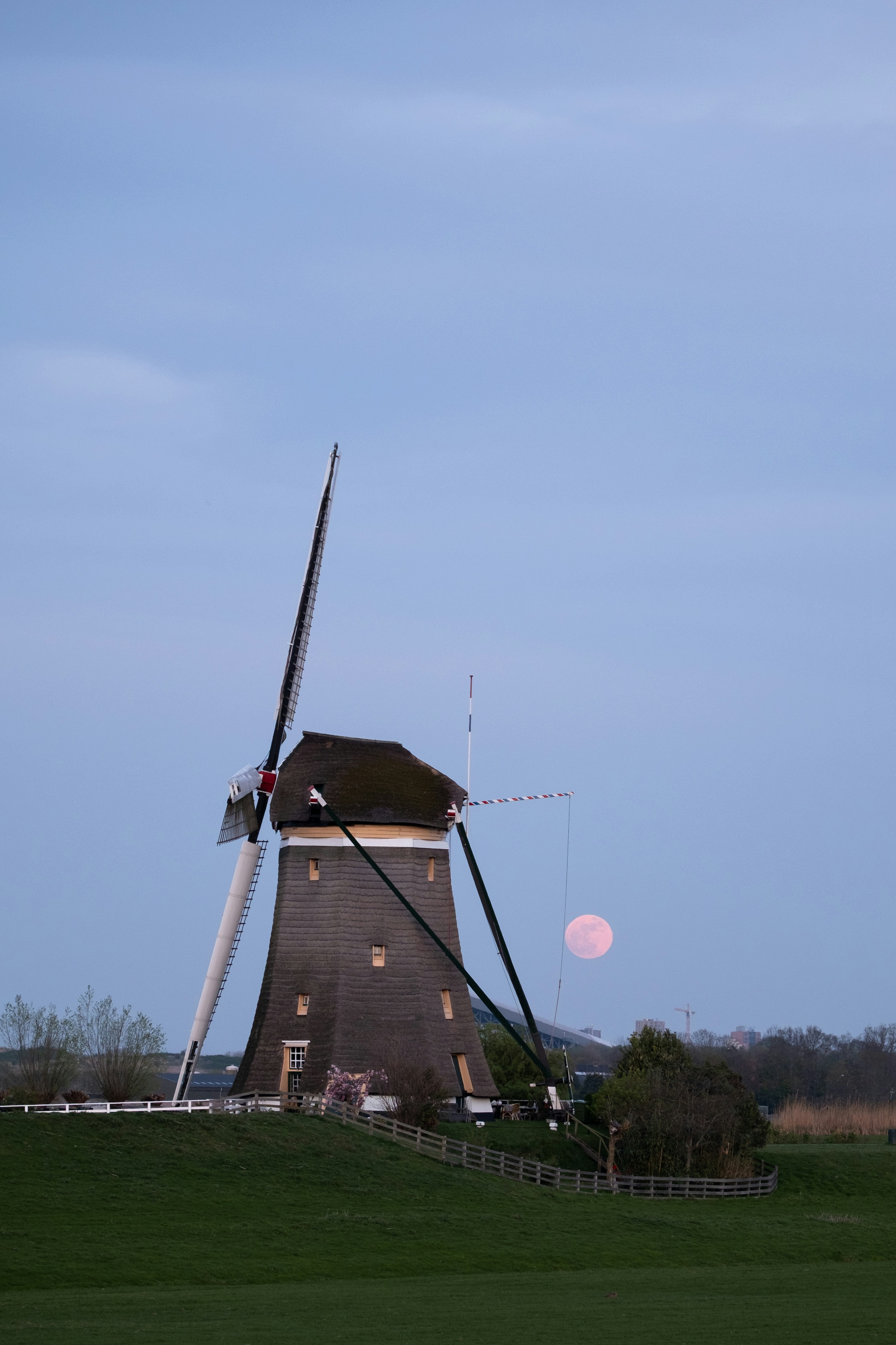 A dutch windmill with a beautiful rising moon. photo – Free Sunset ...