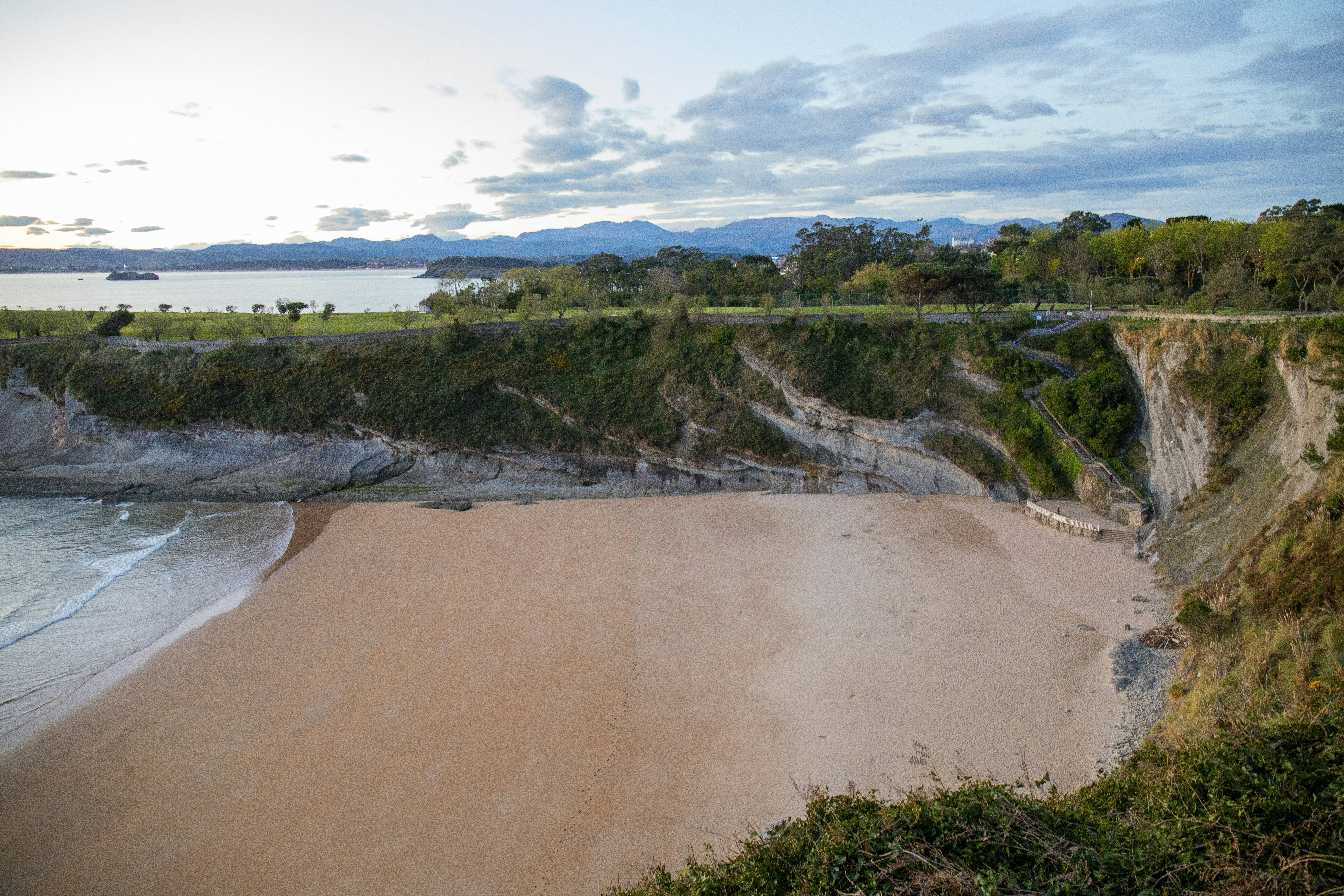 Cliffside Cove: Sand, Sea, and a Winding Coastal Path