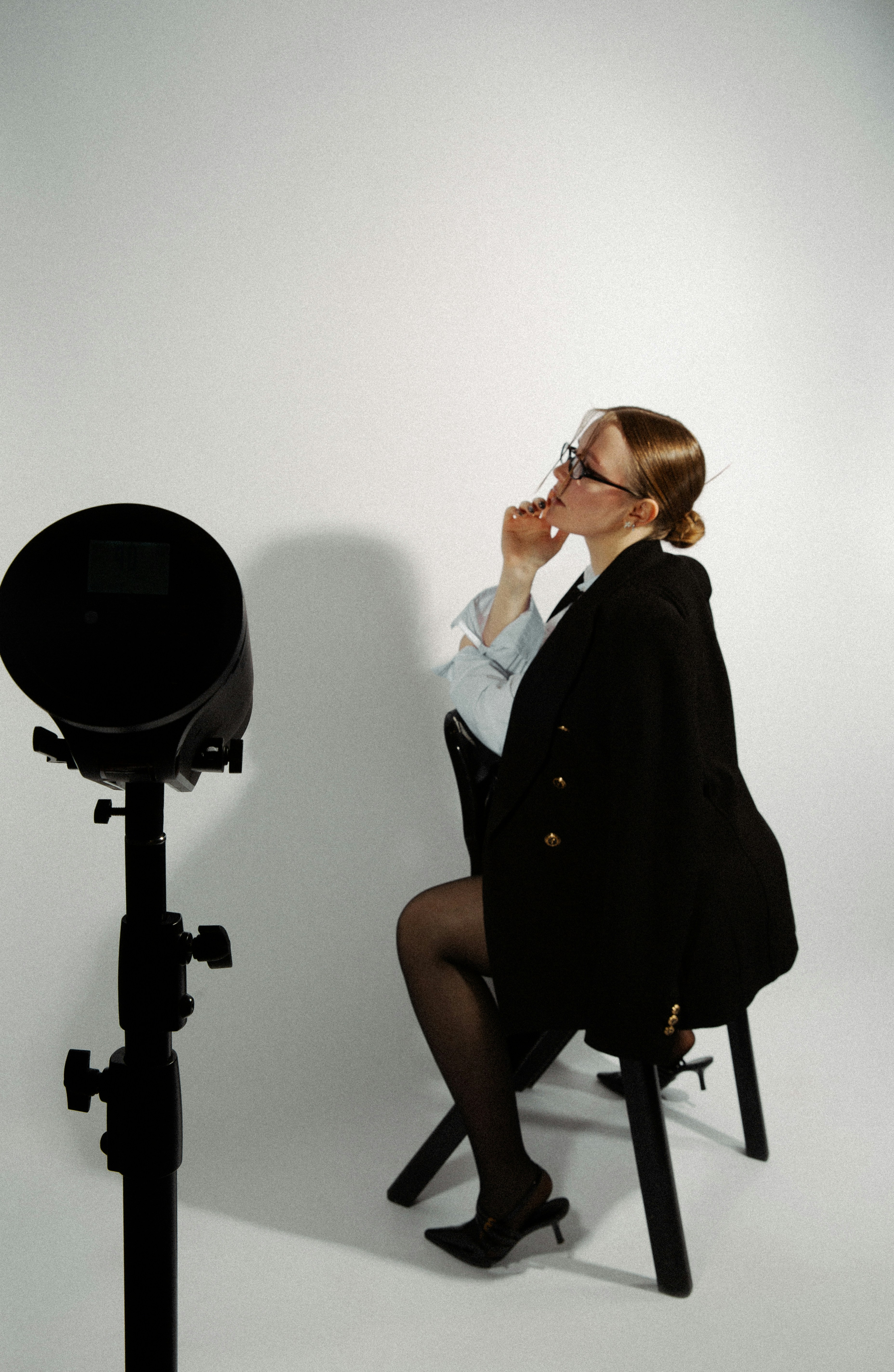 Woman poses in a studio, contemplating something. photo – Free ...