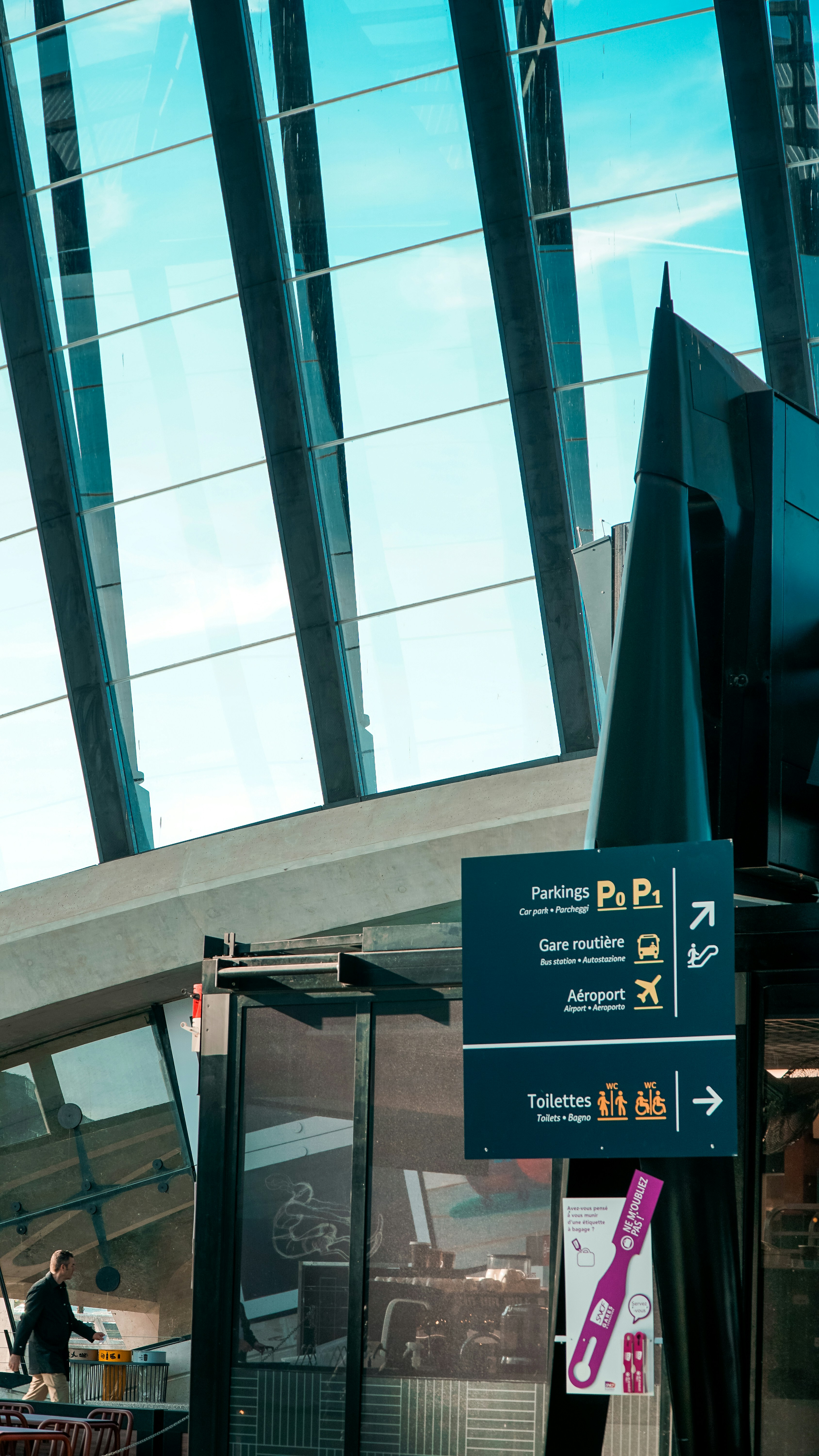 A modern building interior with directional signs. photo – Free Public ...