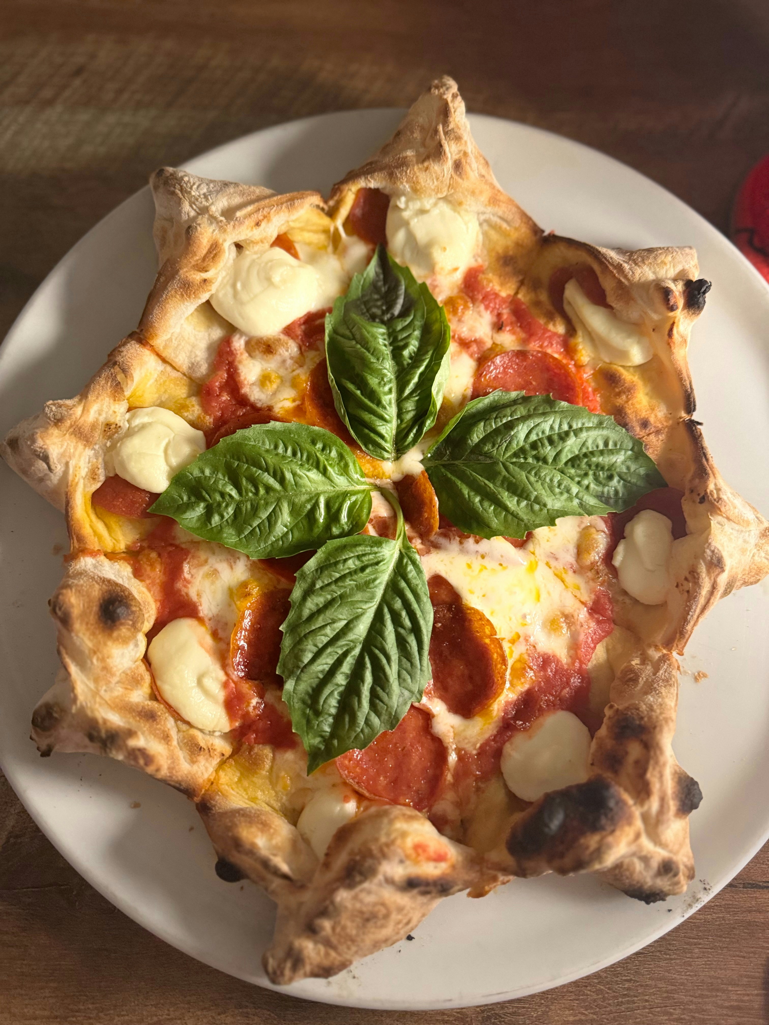 Star-shaped pizza topped with basil and mozzarella. photo – Free Food ...