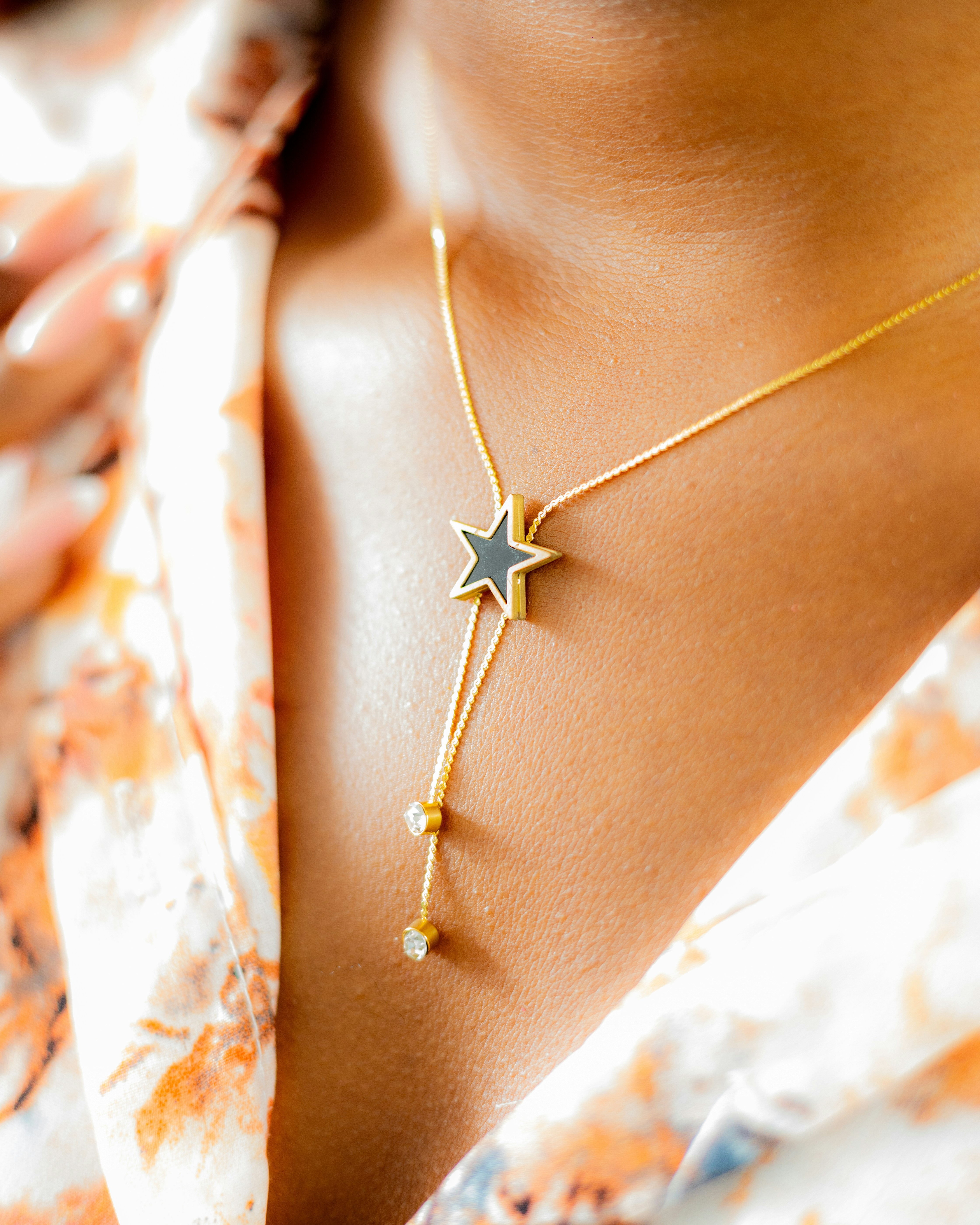 Sunlit Star Pendant: a Delicate Necklace in Soft Focus
