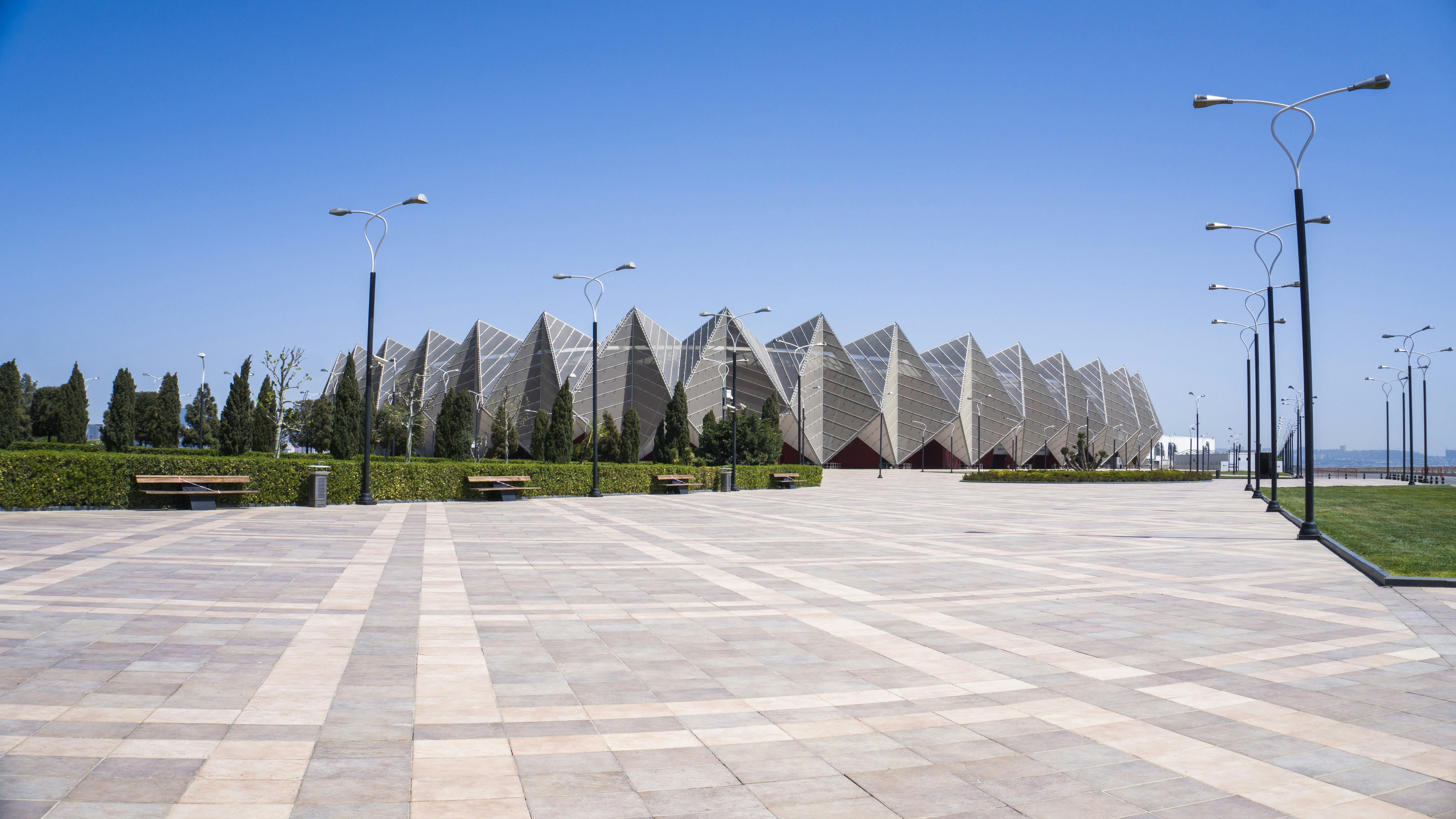 Diamond Roofline by the Sea: A Promenade of Light and Geometry