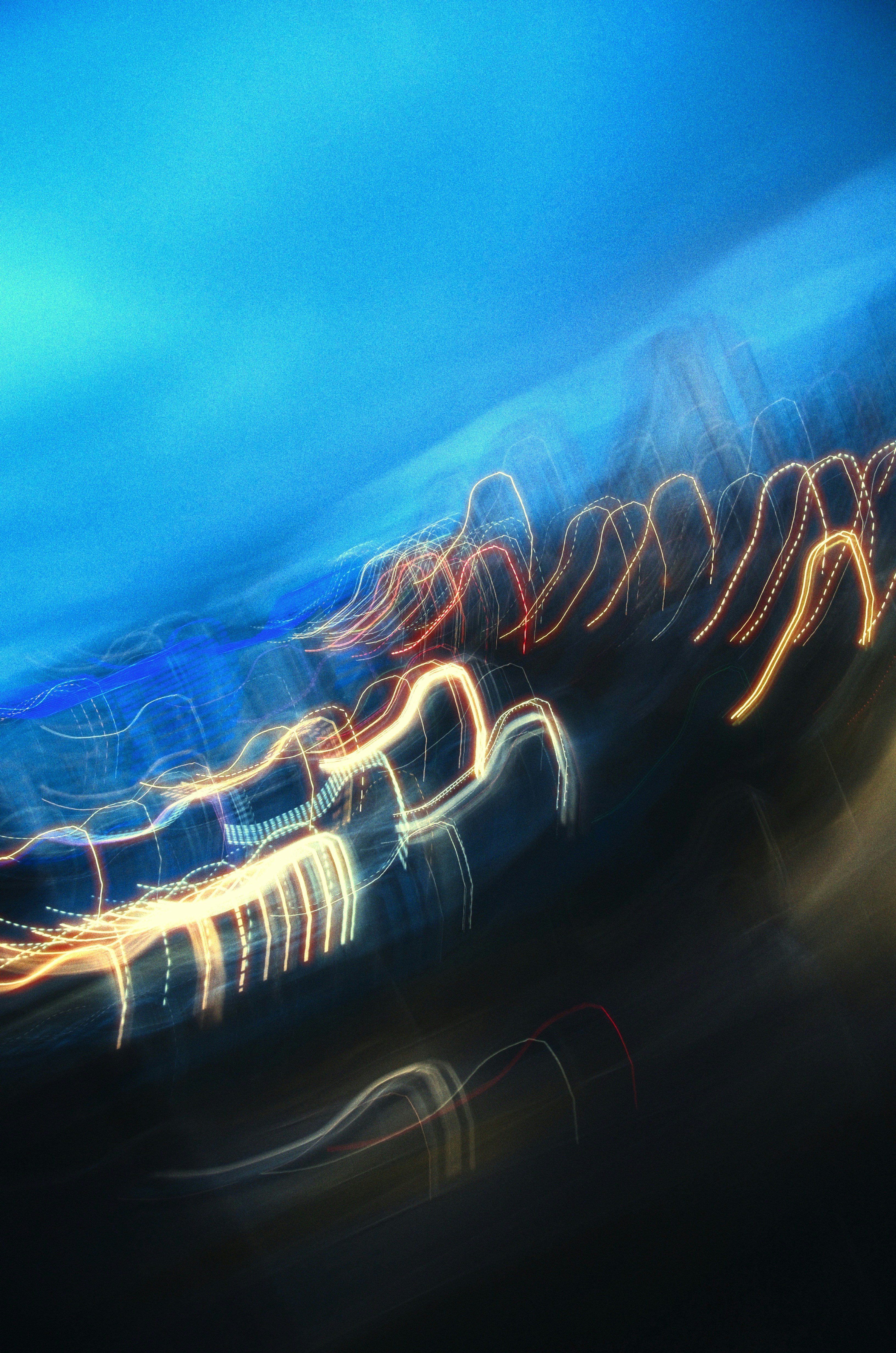 Abstract streaks of light create a blurred, colorful image. photo ...