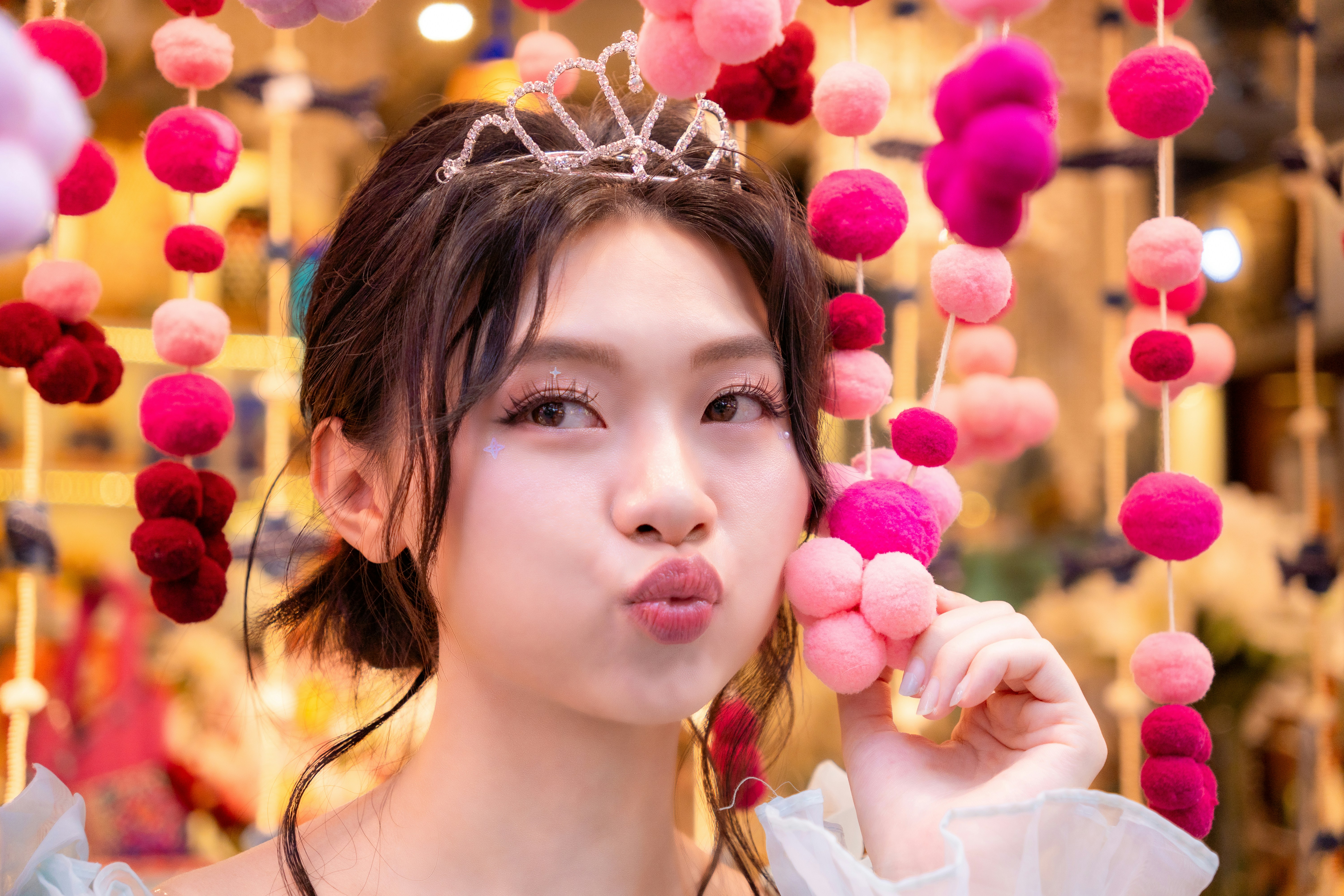 A princess poses with pink decorations. photo – Free Woman Image on ...