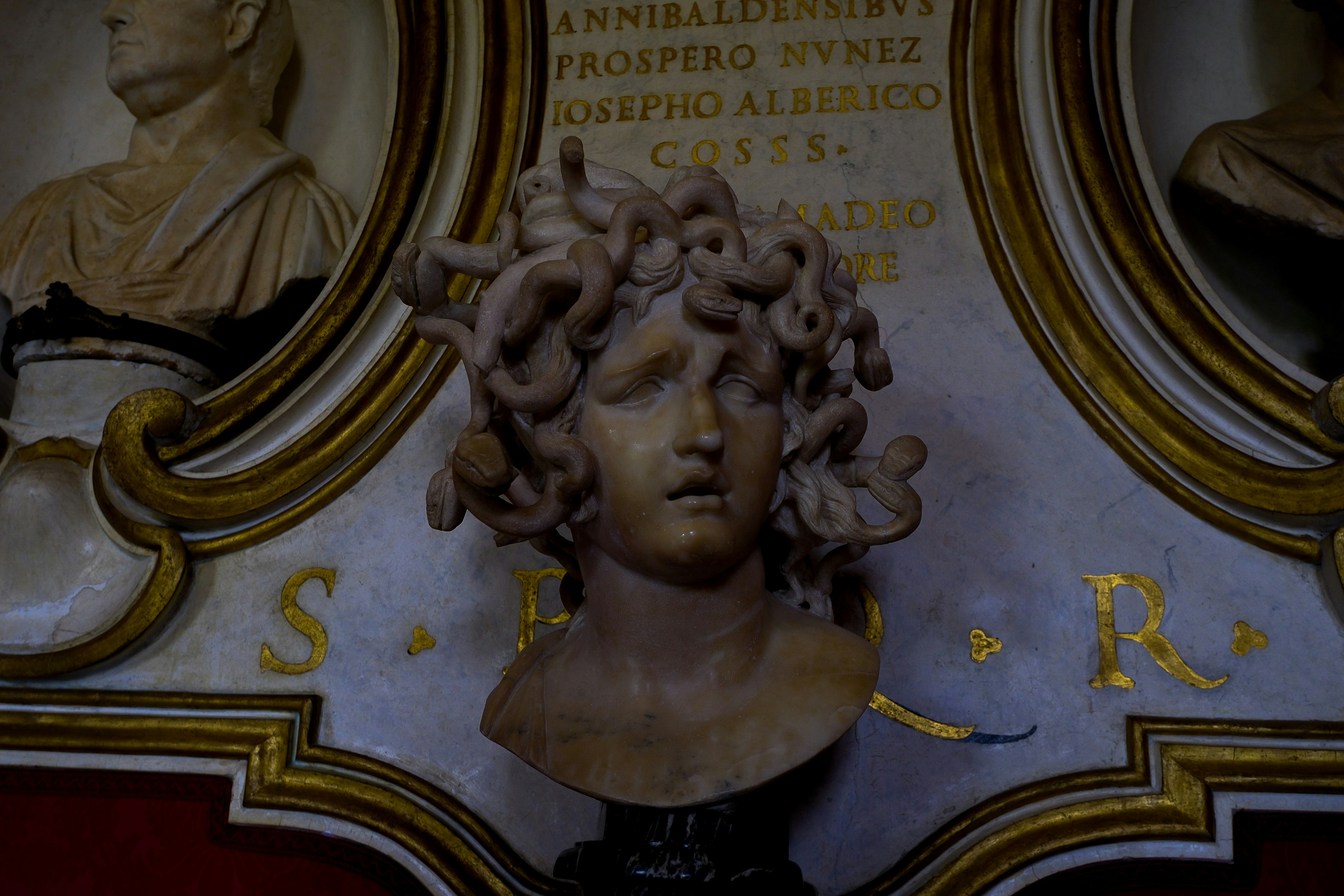 Medusa's Gaze Beneath Gold and Marble