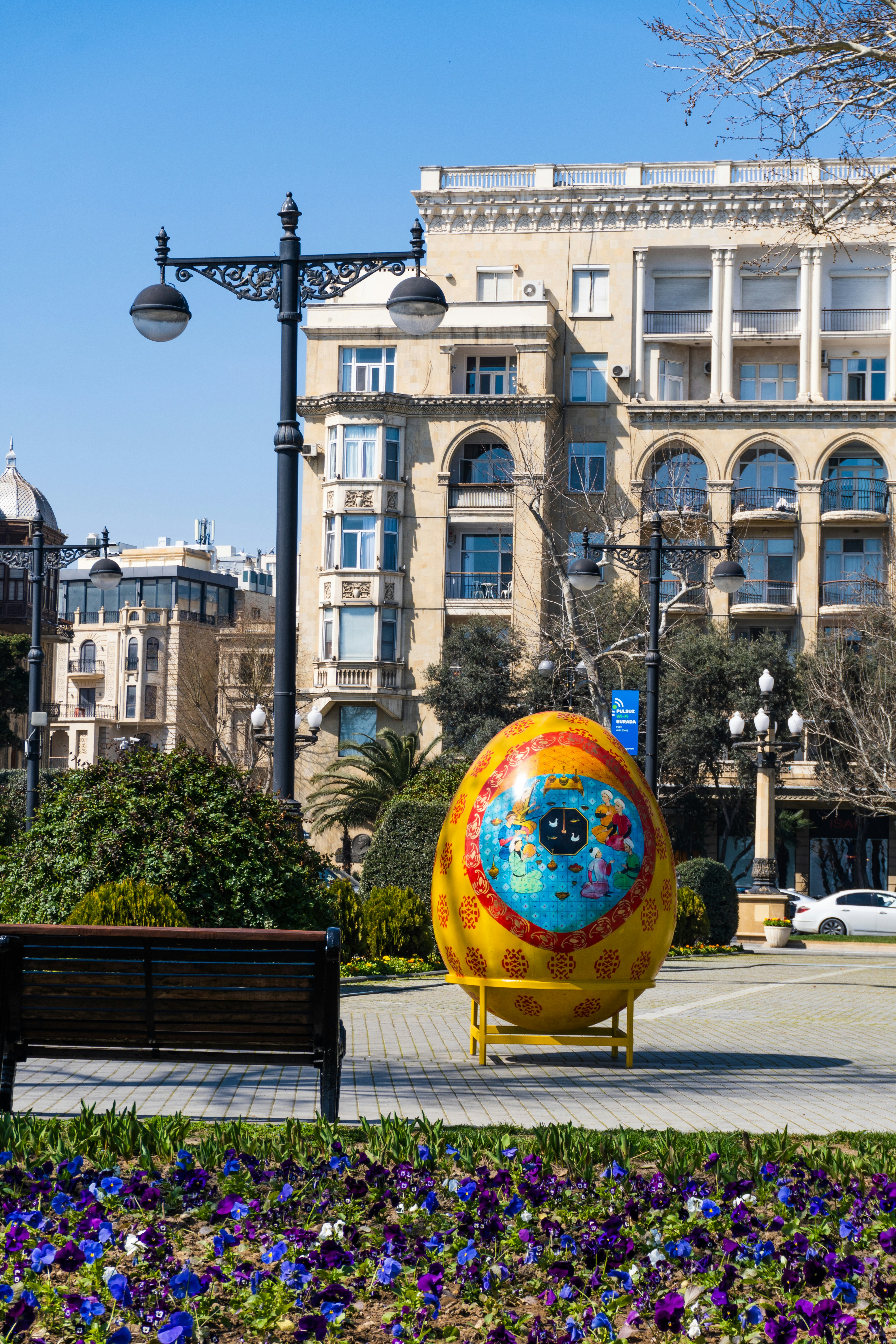Bright Easter Egg Sculpture Anchors a Sunlit City Park
