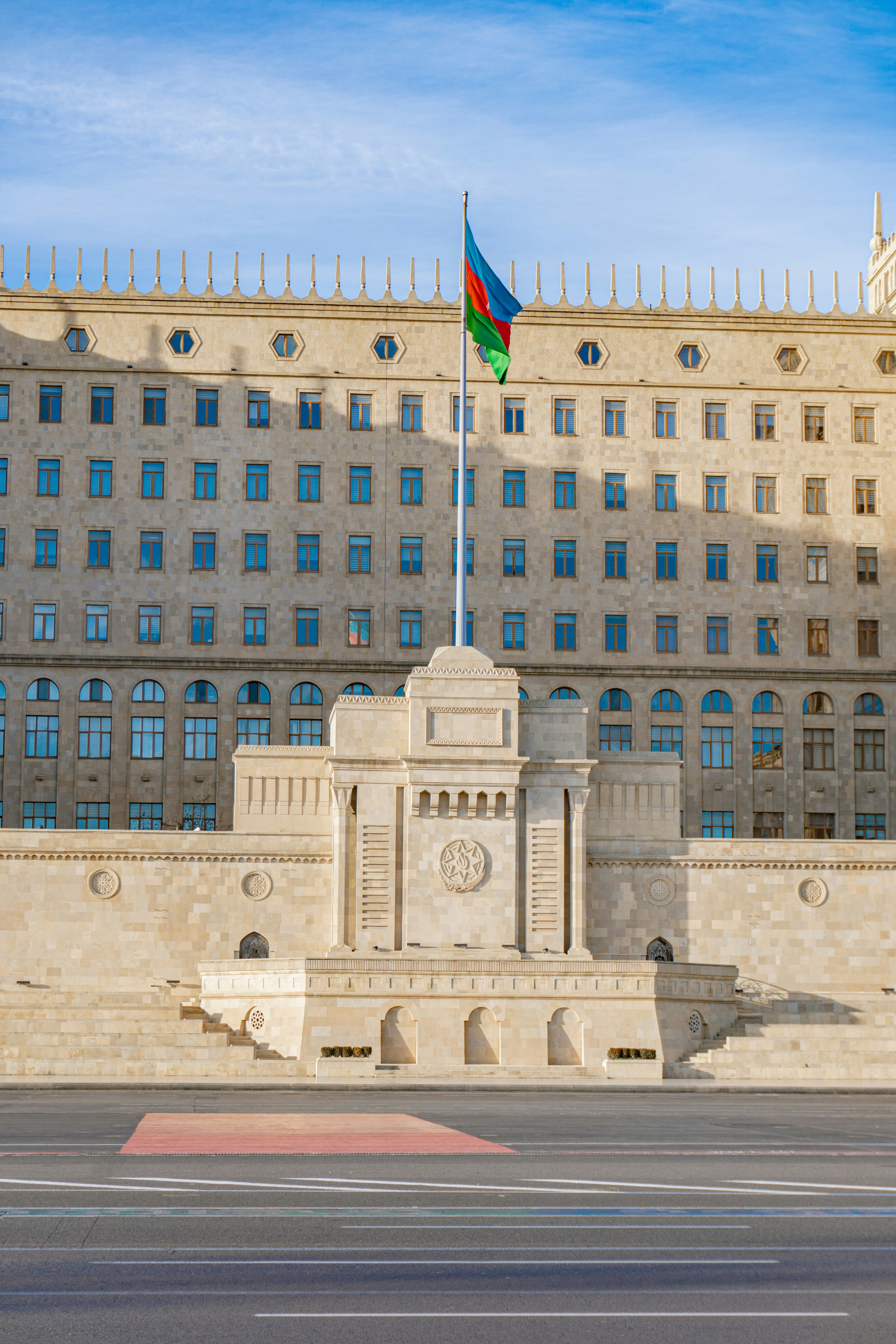 Flag Above Marble Steps: Symmetry and Stone in a Civic Facade