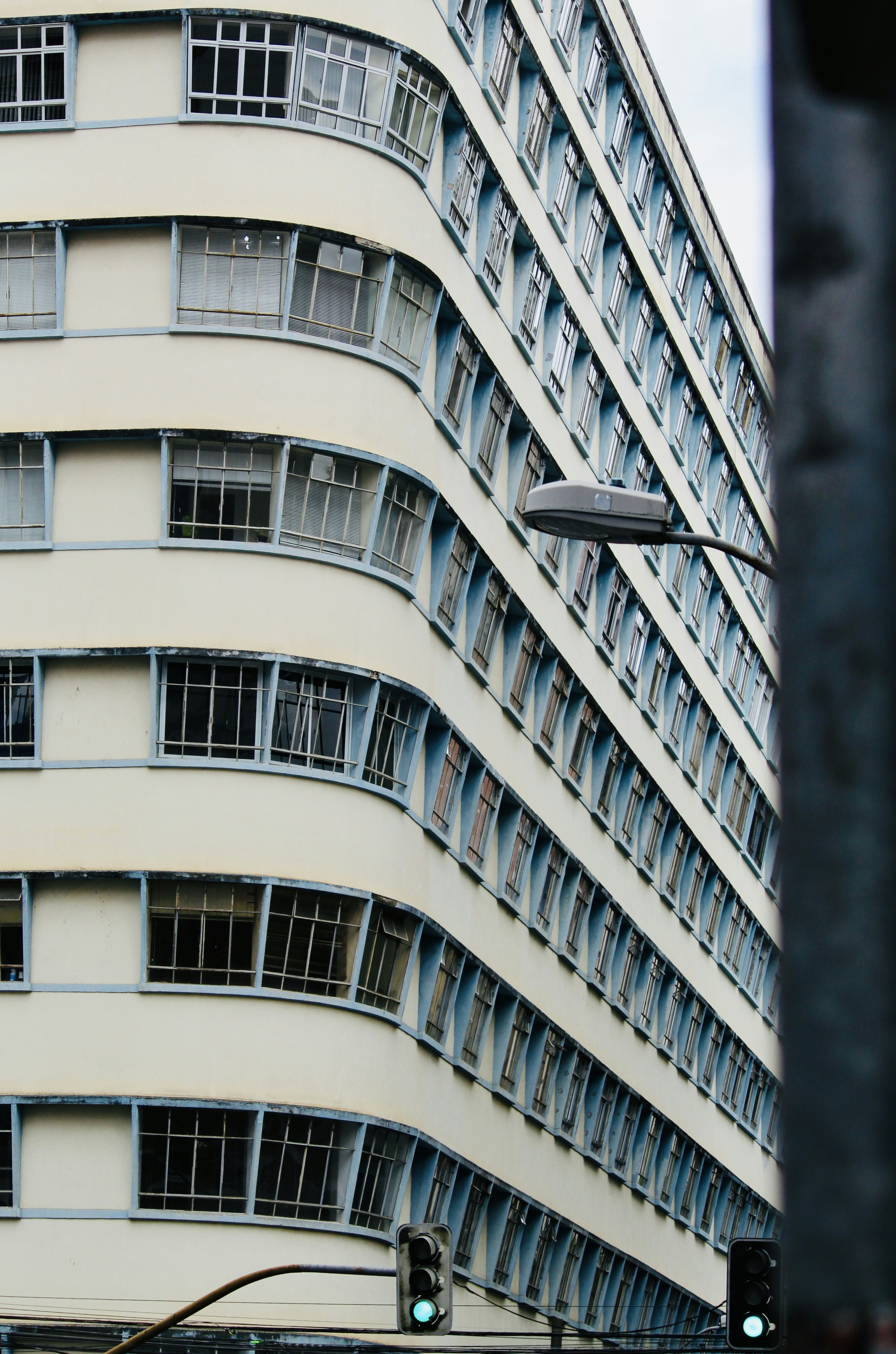 A curving building is visible with many windows. photo – Free Curitiba ...
