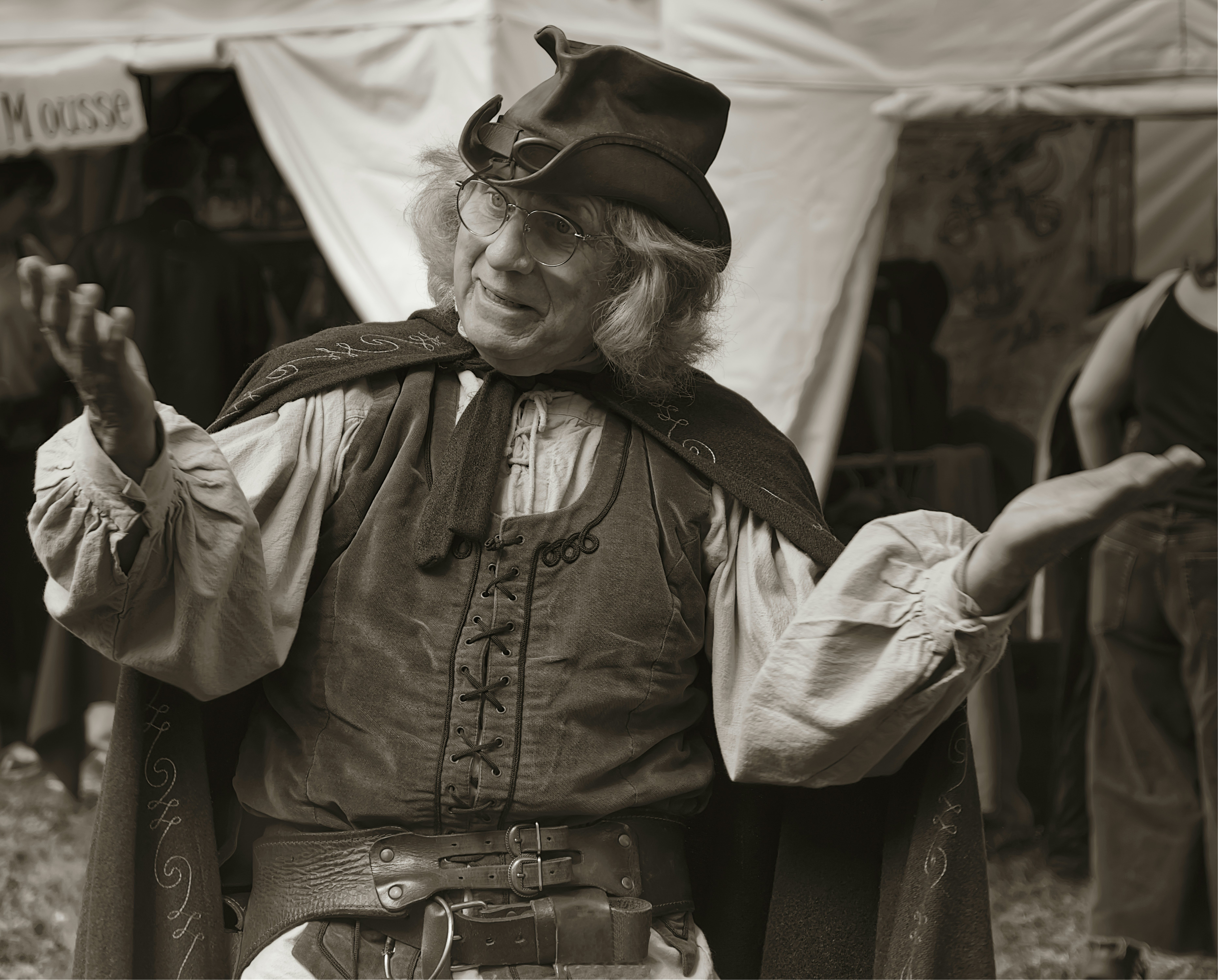 Sepia Serenade: A Renaissance Performer Beneath Canvas