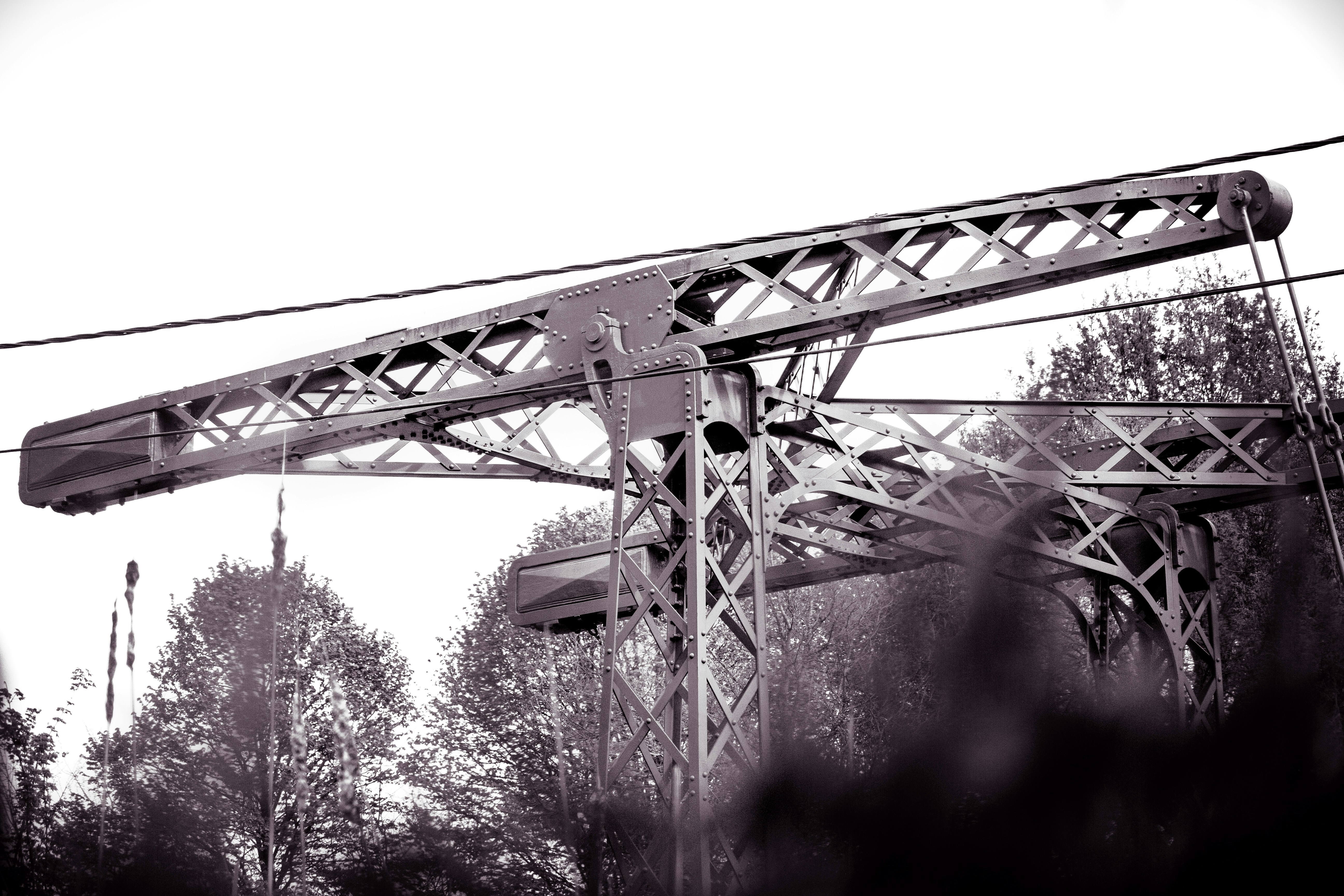 Ironwork in Focus: The Lattice Bridge under a Pale Sky