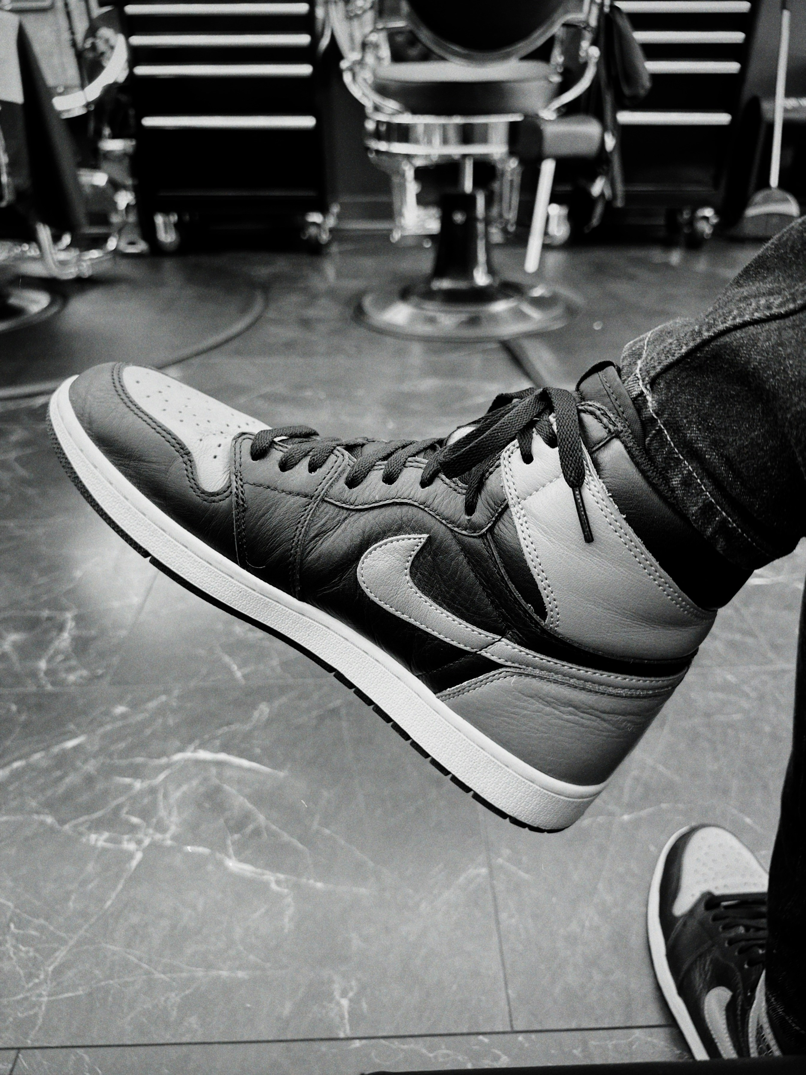 Jordan sneakers | Showing off a stylish air jordan 1 sneaker.