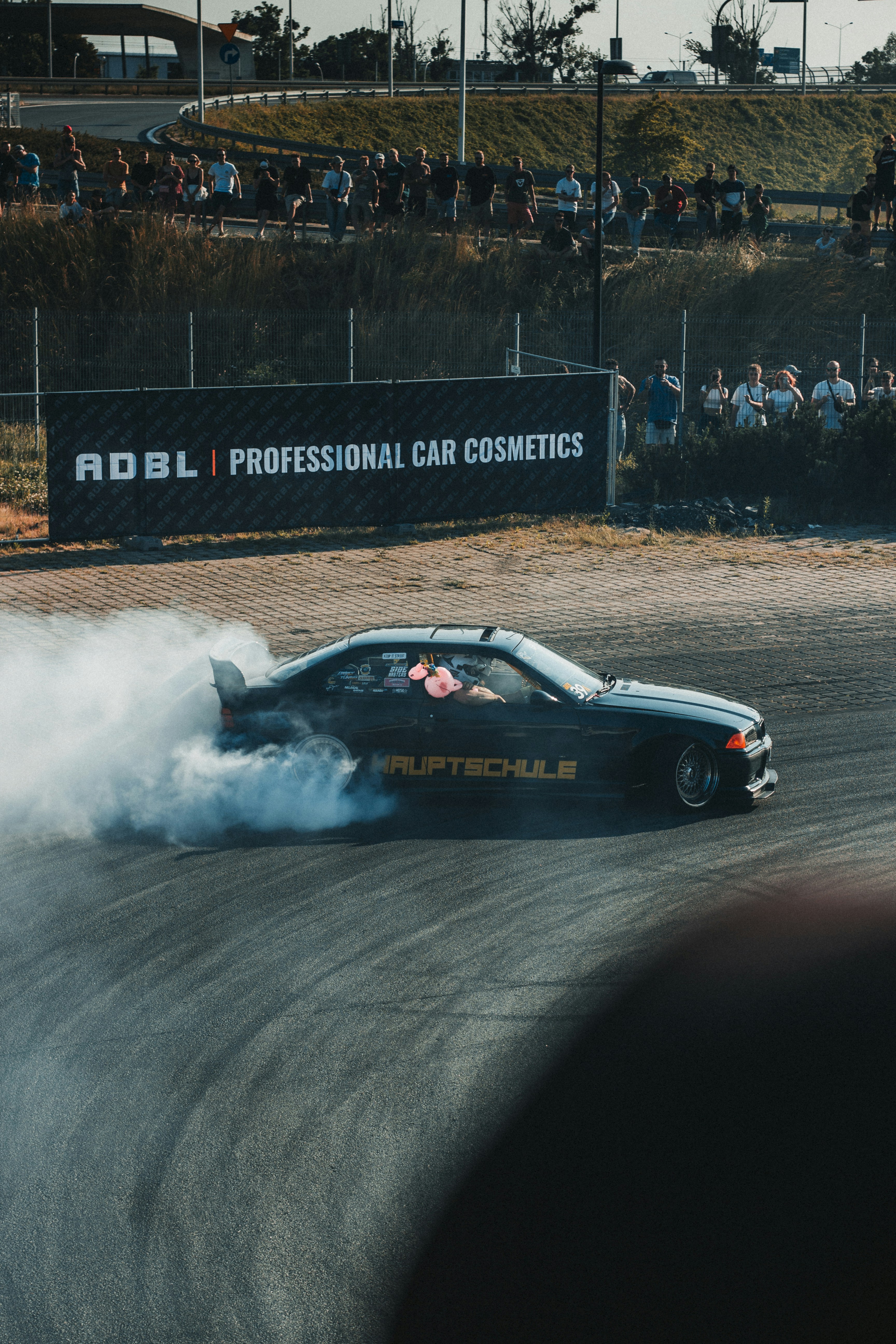 Drift and Smoke: A Mysterious Black Beast Exhausts the Track