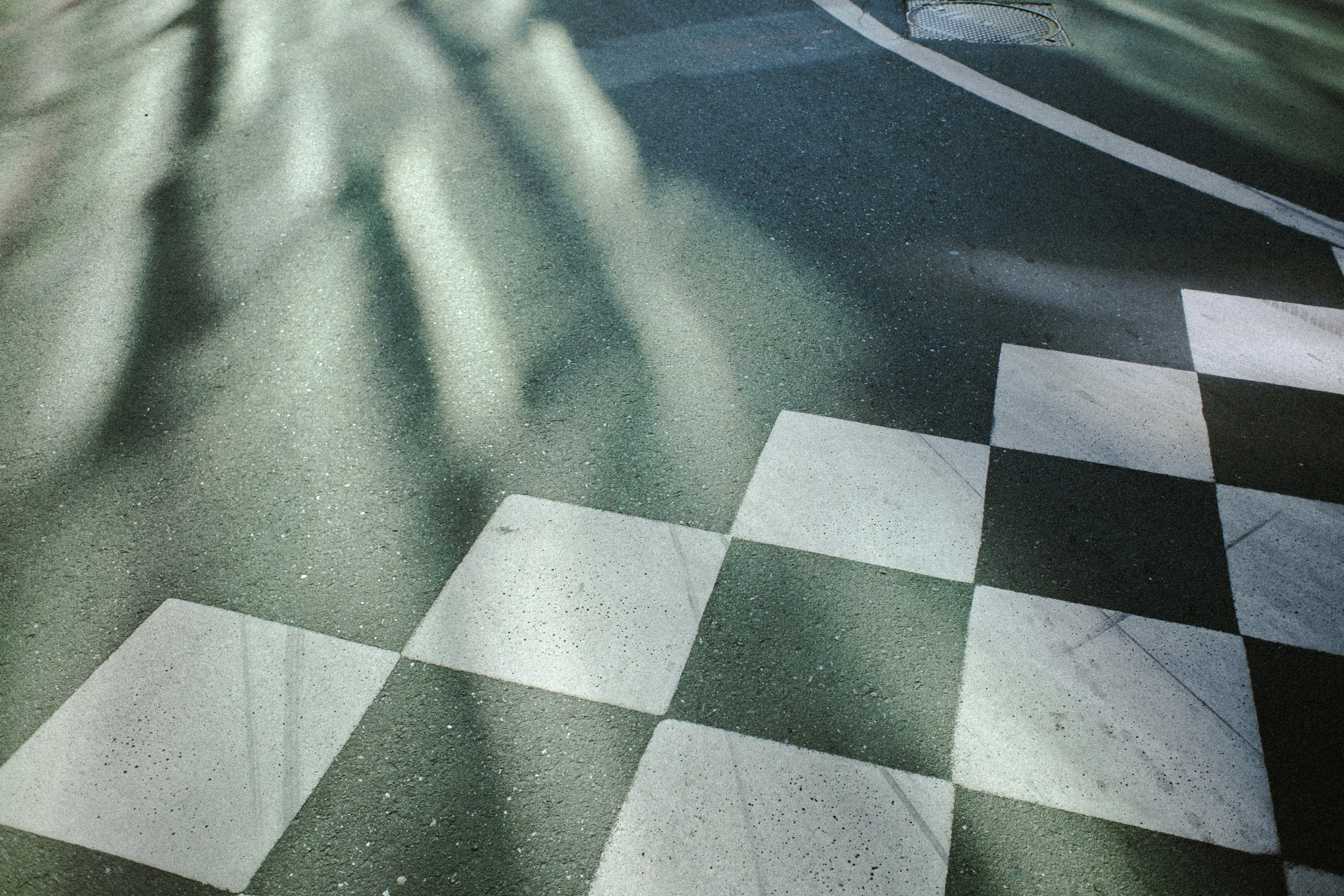 A black and white tile floor with shadows. photo – Free Texture Image ...
