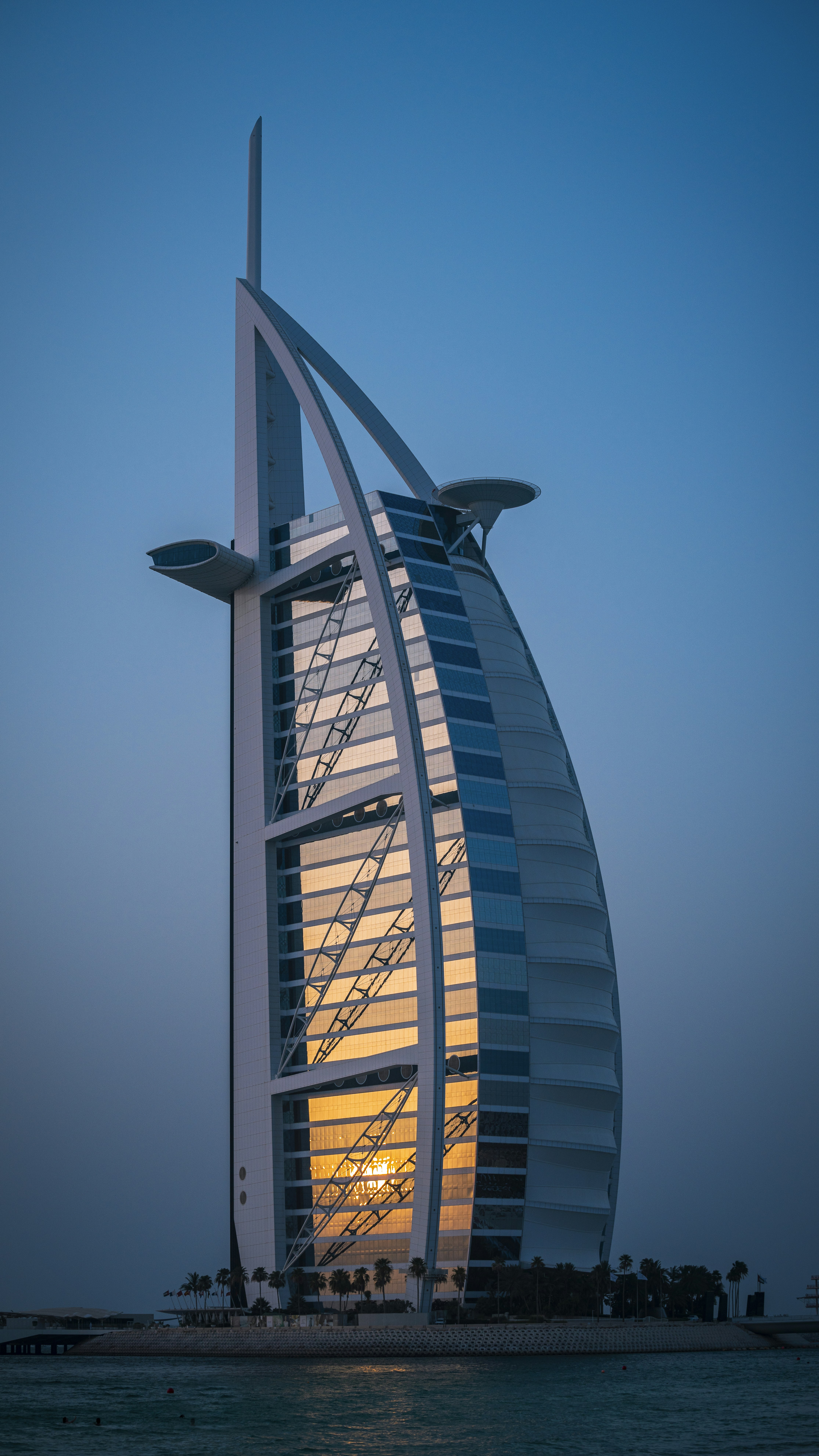 Burj al arab reflecting the sunset over the water. photo – Free ...