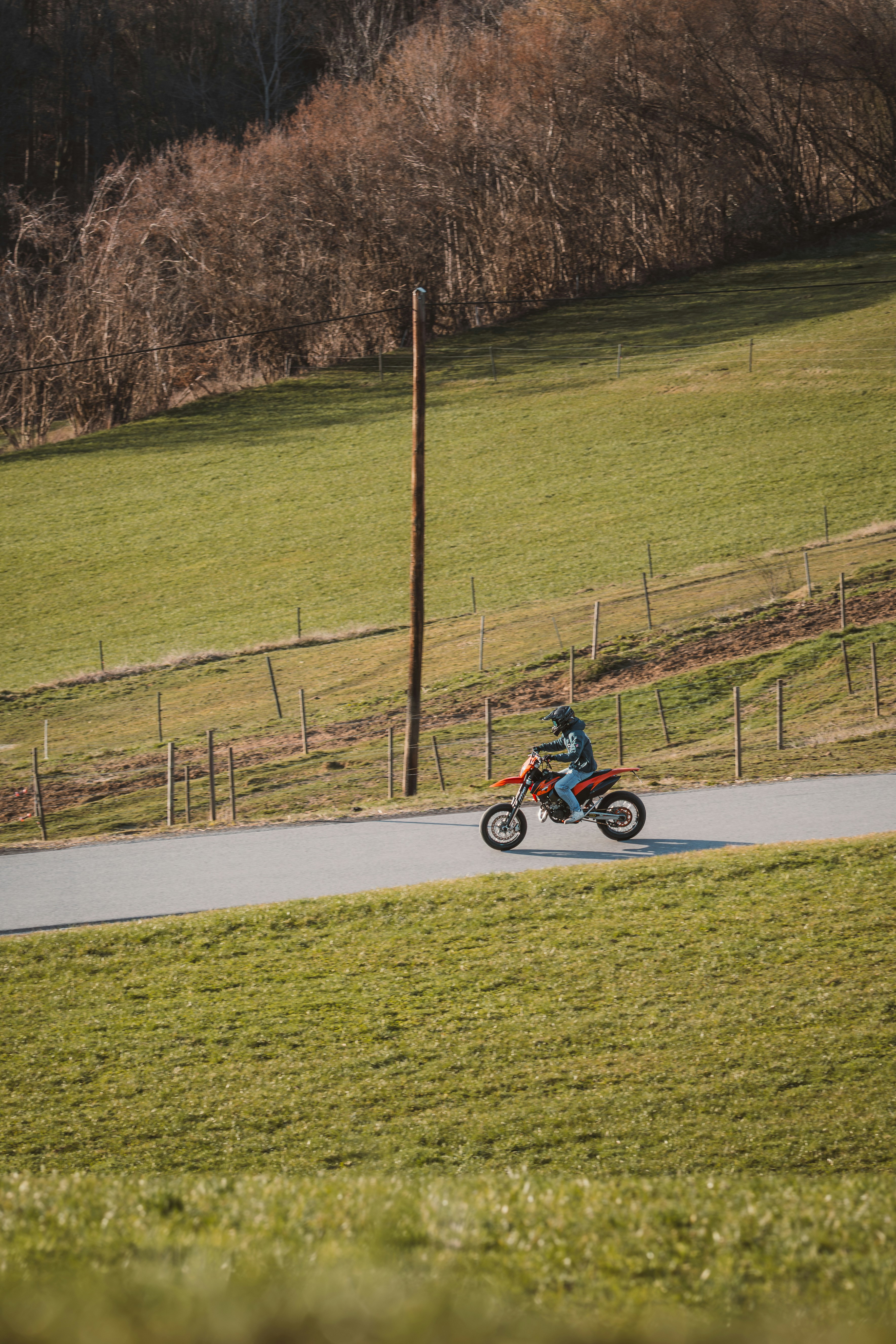 Rider in Motion along a Quiet Countryside Lane