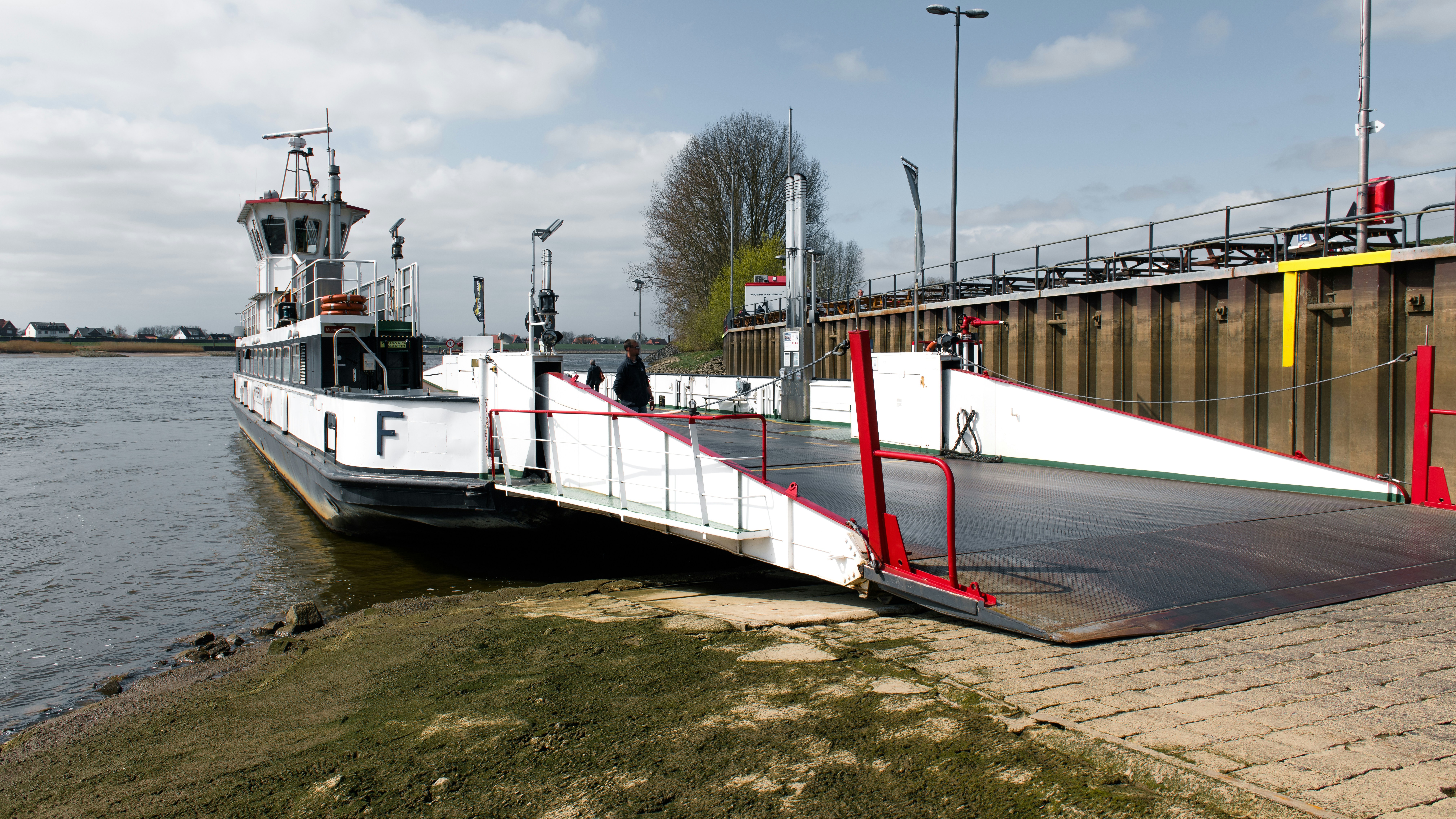 A ferry is docked and ready to load. photo – Free Transport Image on ...