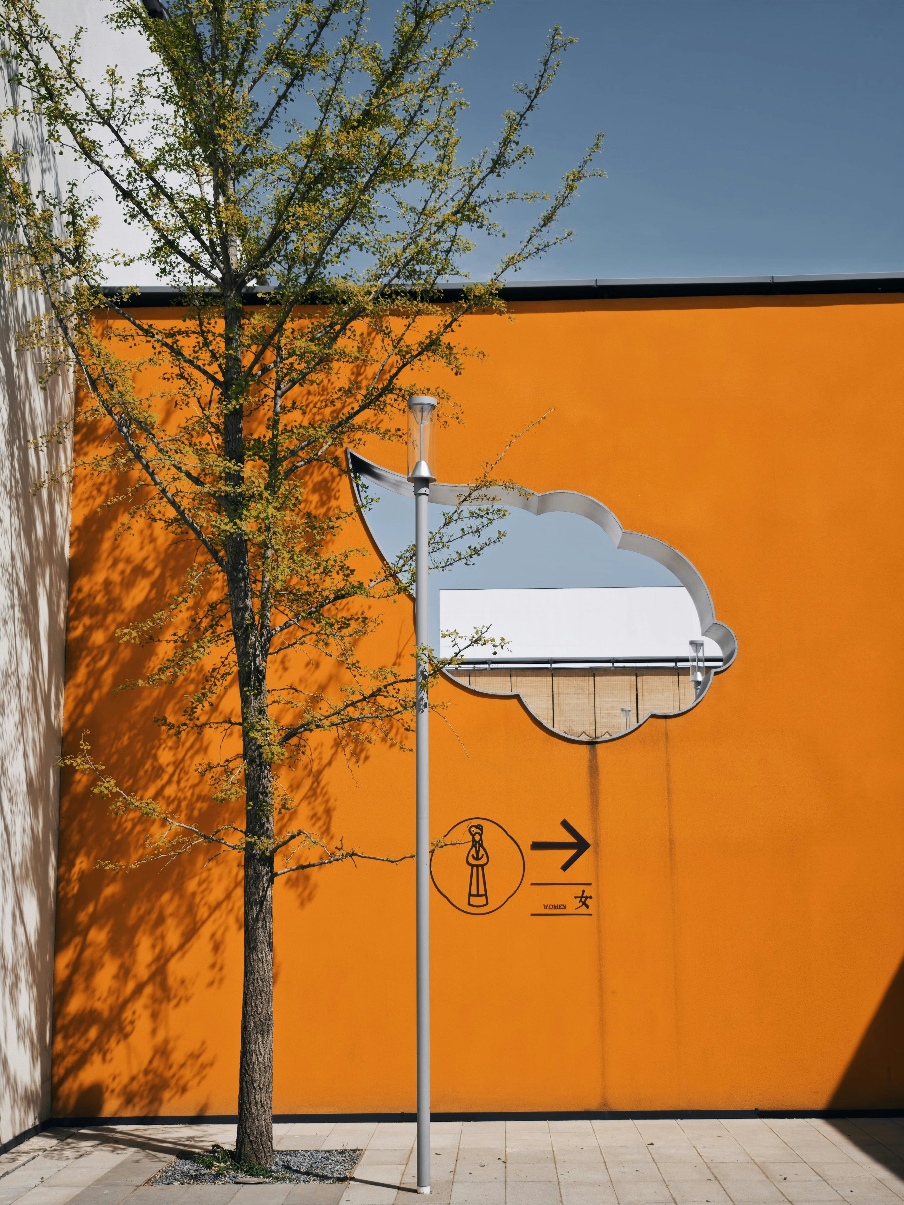 An orange wall features a leaf-shaped window. photo – Free Image on ...