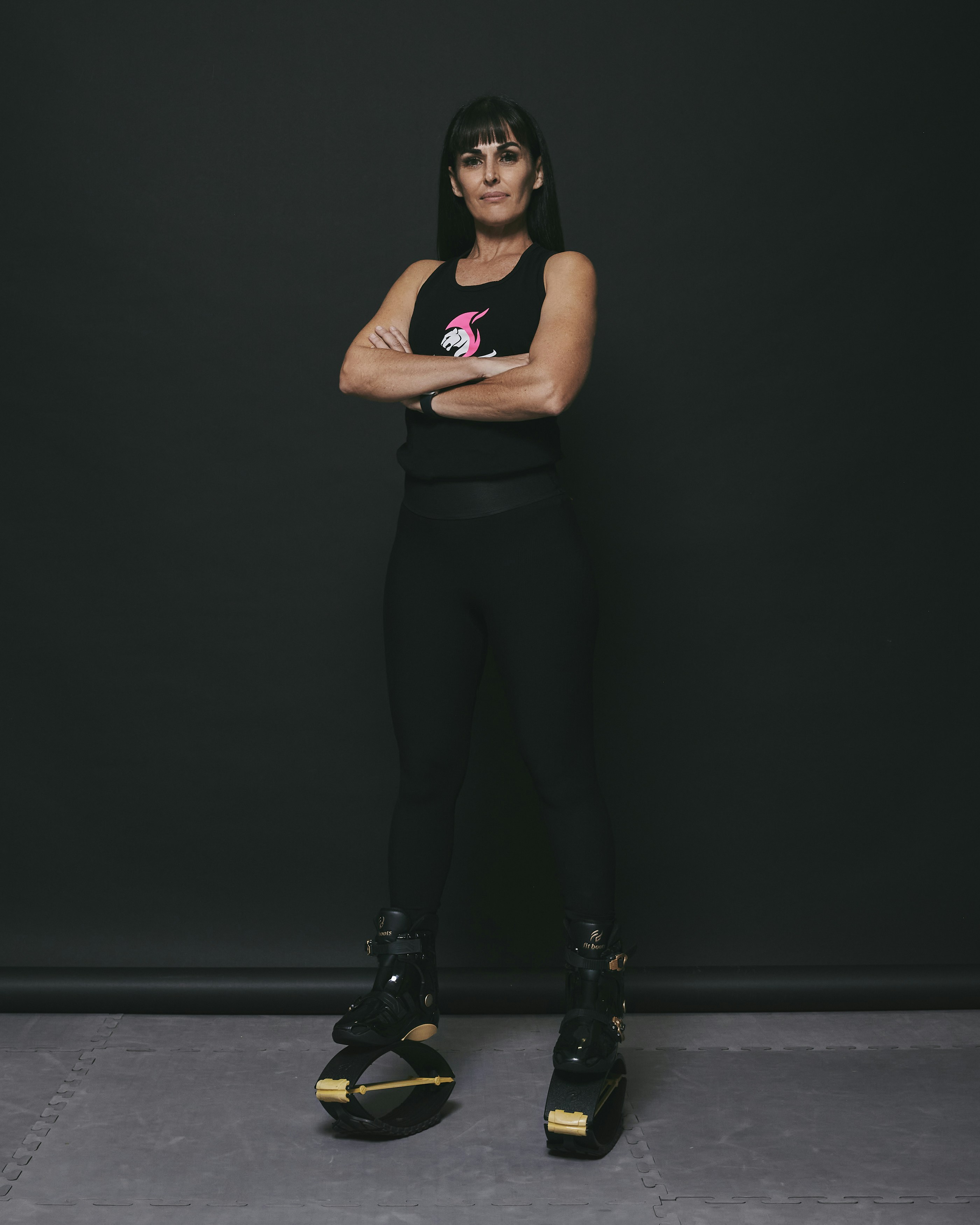 Confident woman stands with bounce boots. photo – Free Image on Unsplash