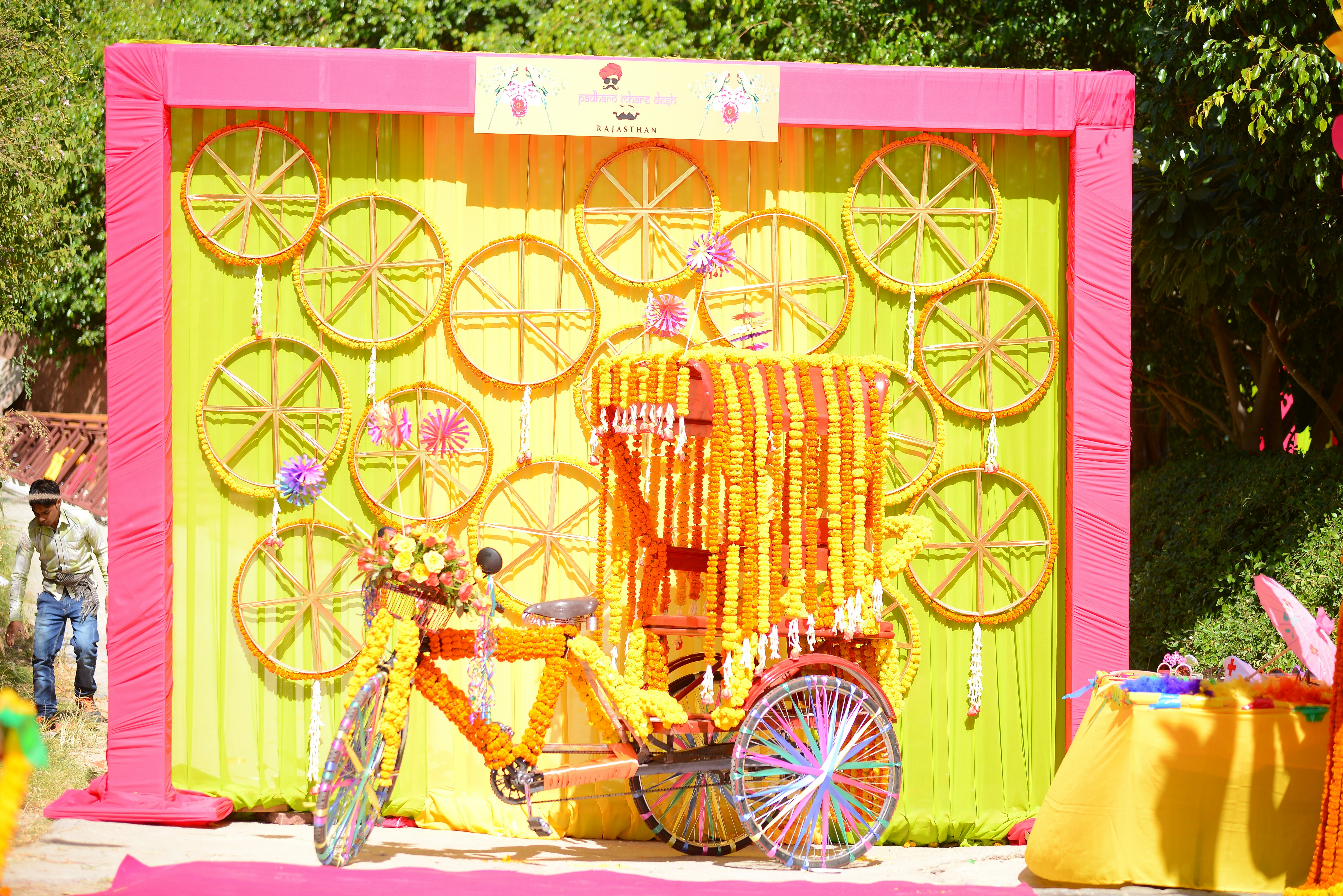 A decorated rickshaw displayed with floral and circular art. photo ...