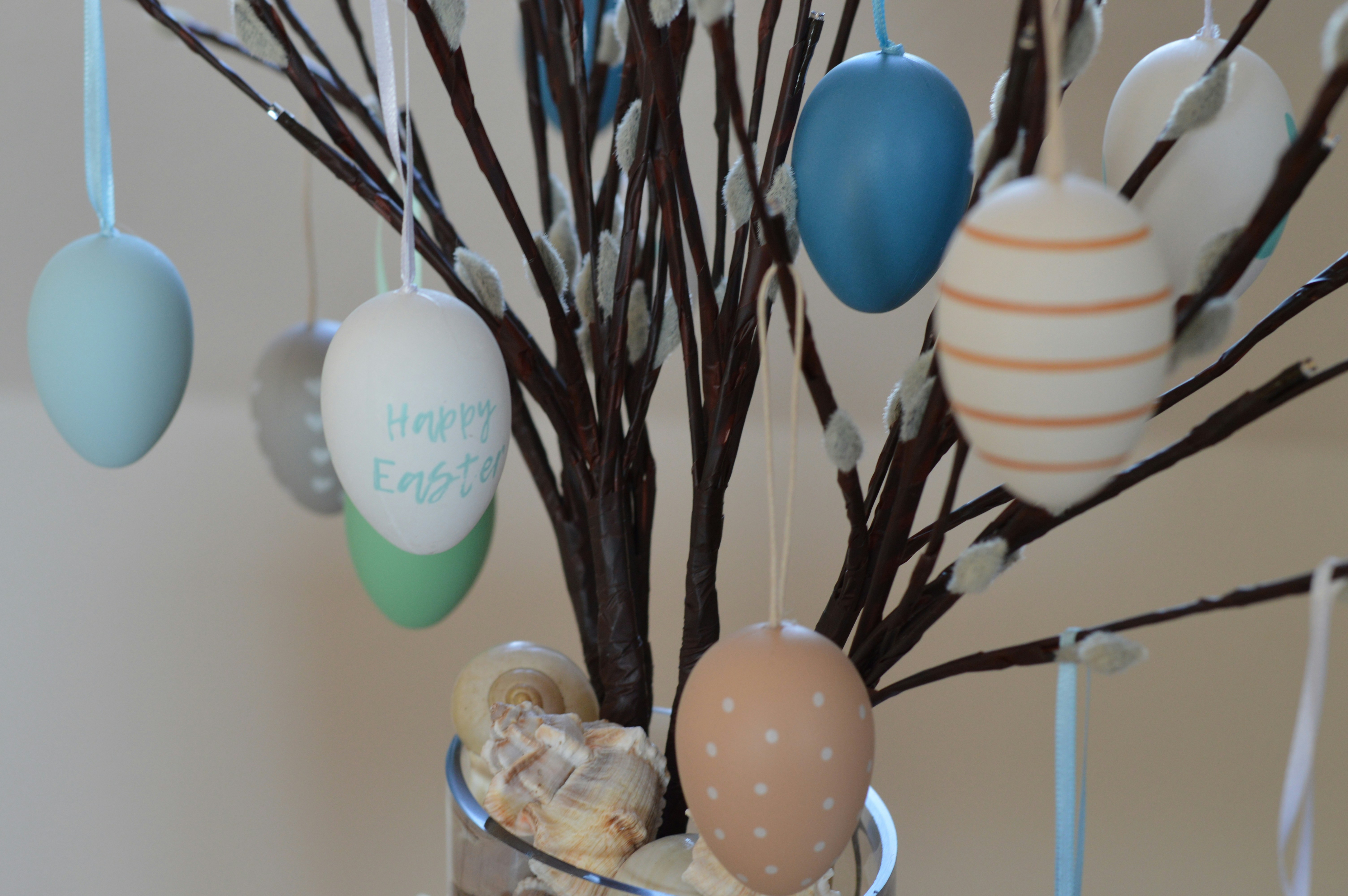 Pastel Easter Ornaments in a Gentle Branch Arrangement