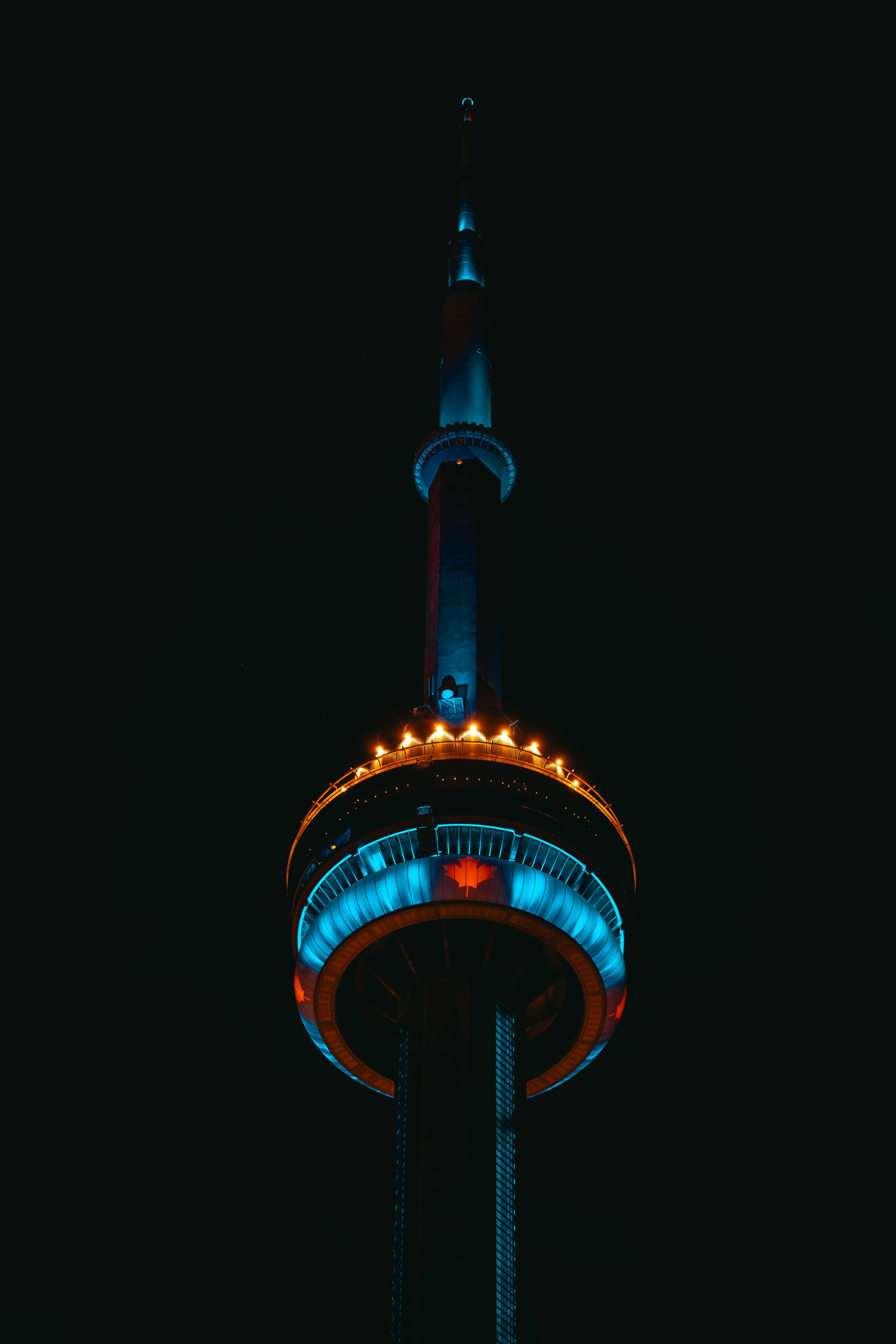 Neon Halo Around a Midnight Spire