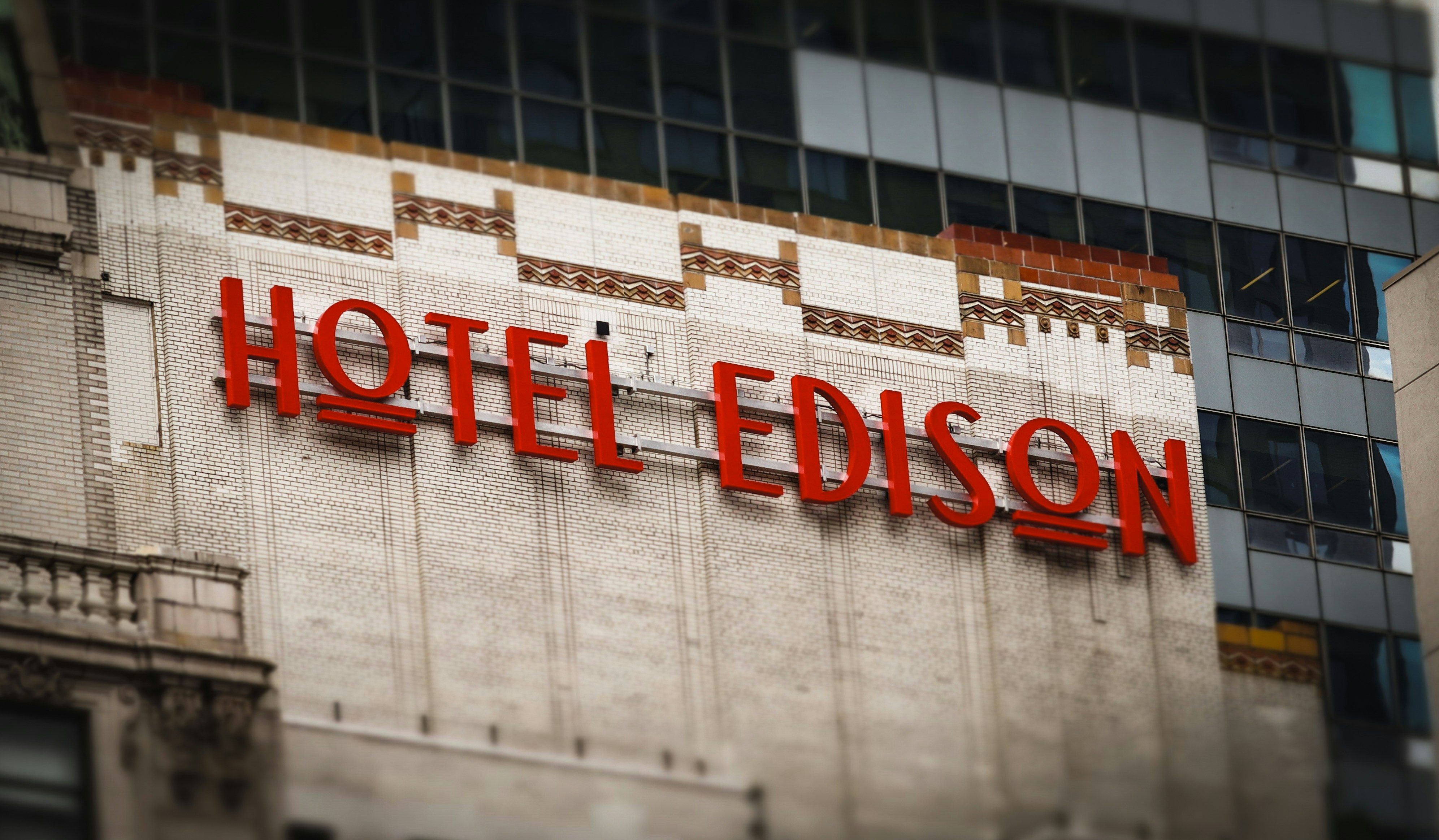 The hotel edison sign is displayed on a building. photo – Free Building ...
