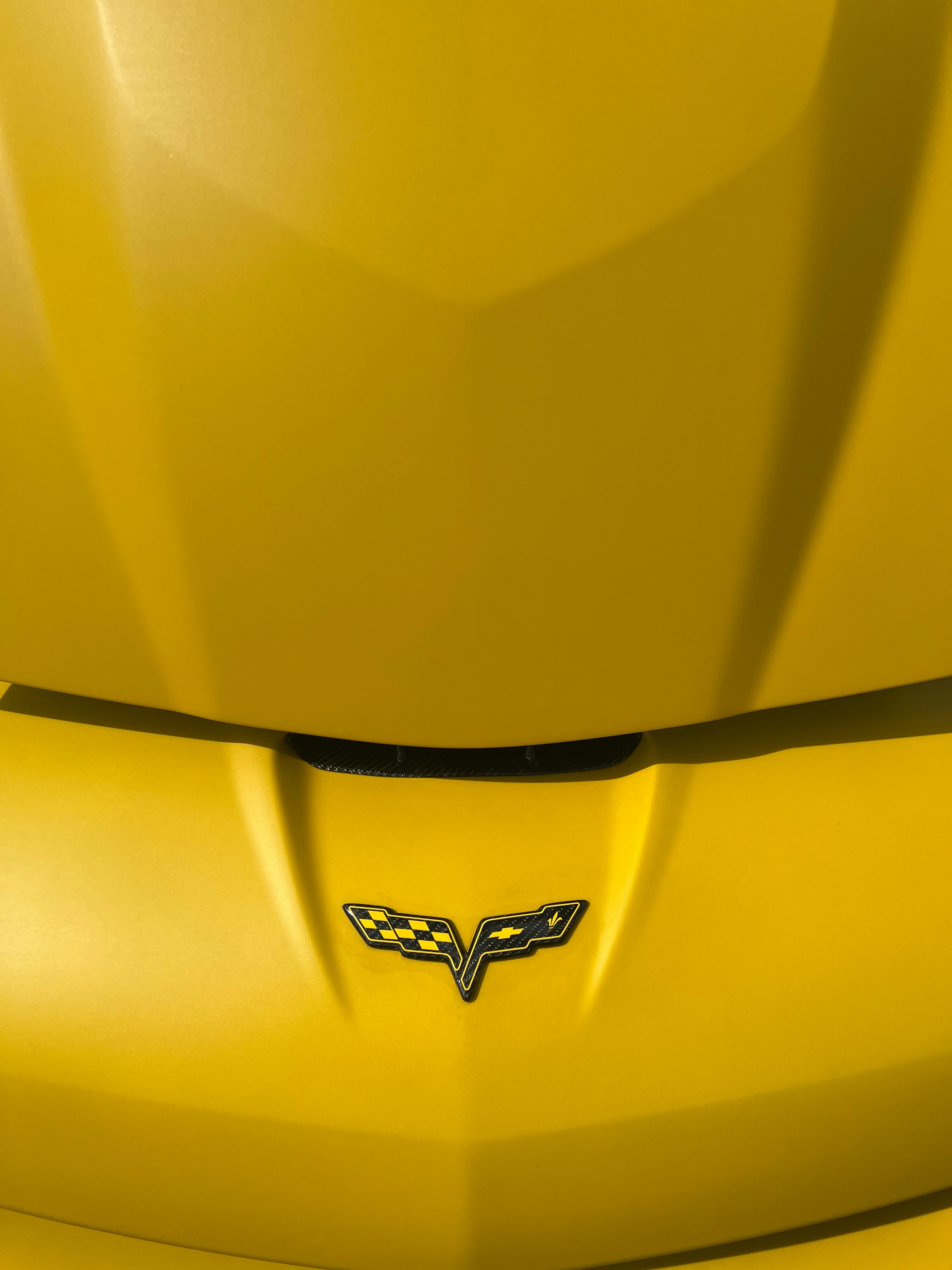 Yellow Corvette Logo