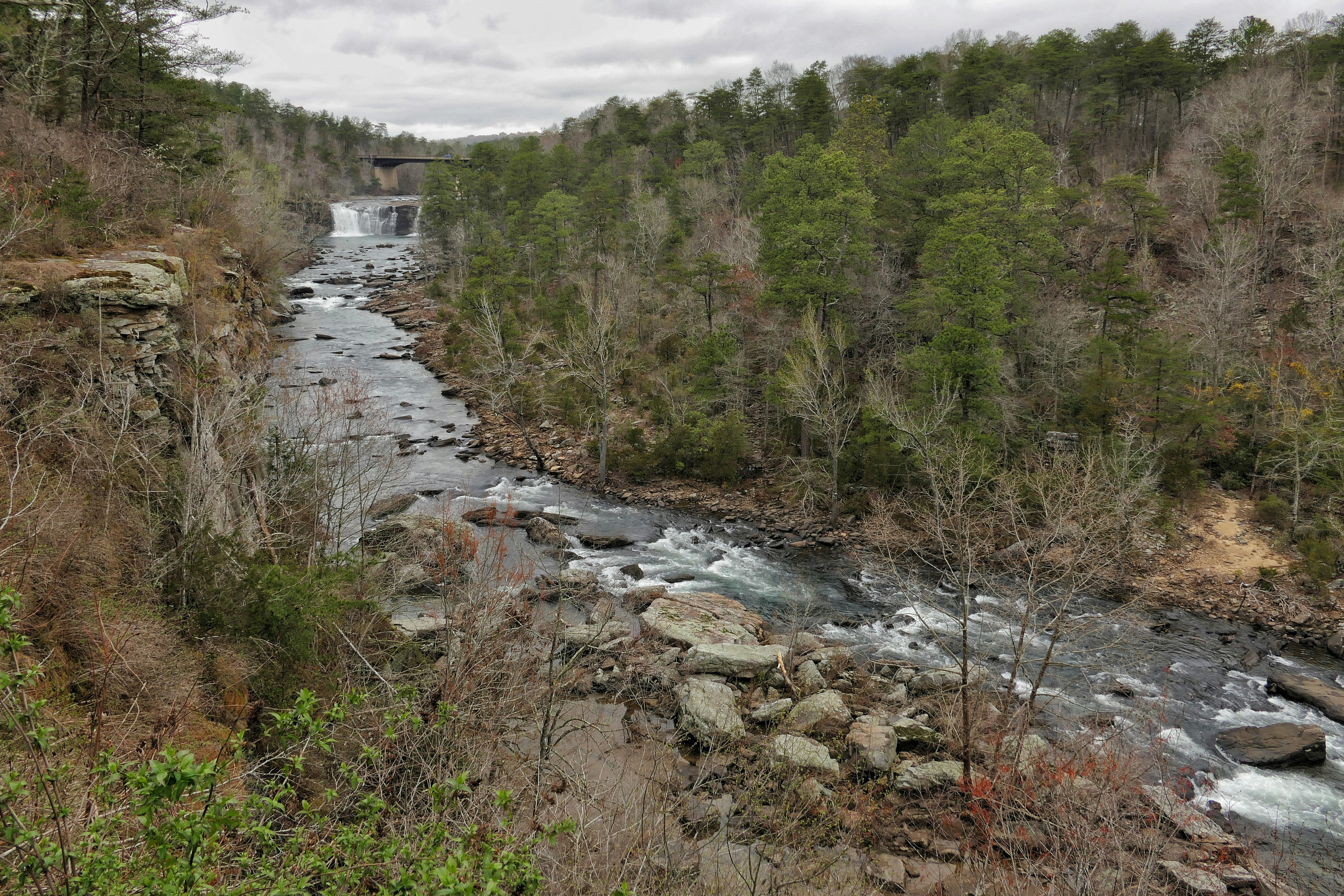 Whispering Gorge: River Meanders Toward a Distant Waterfall