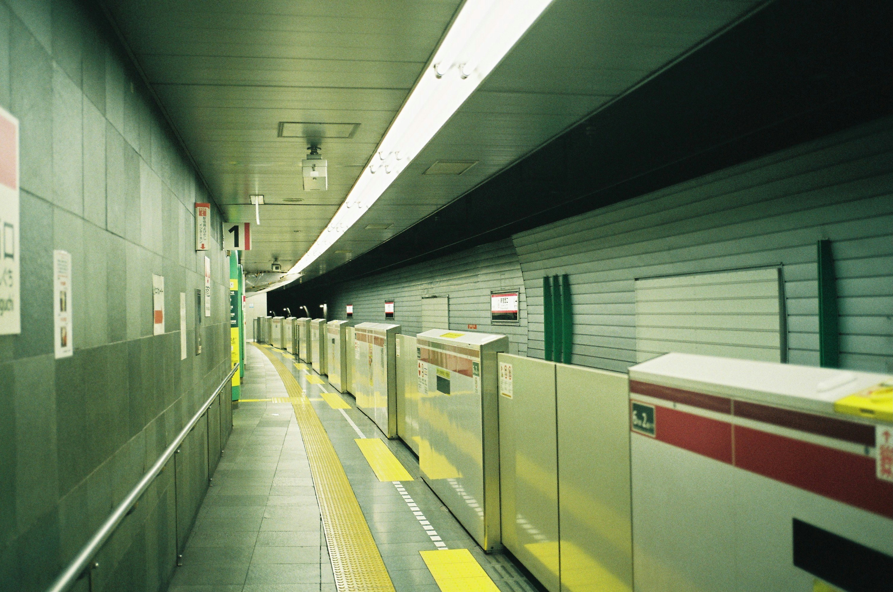Waiting for the last train | An empty subway station platform.