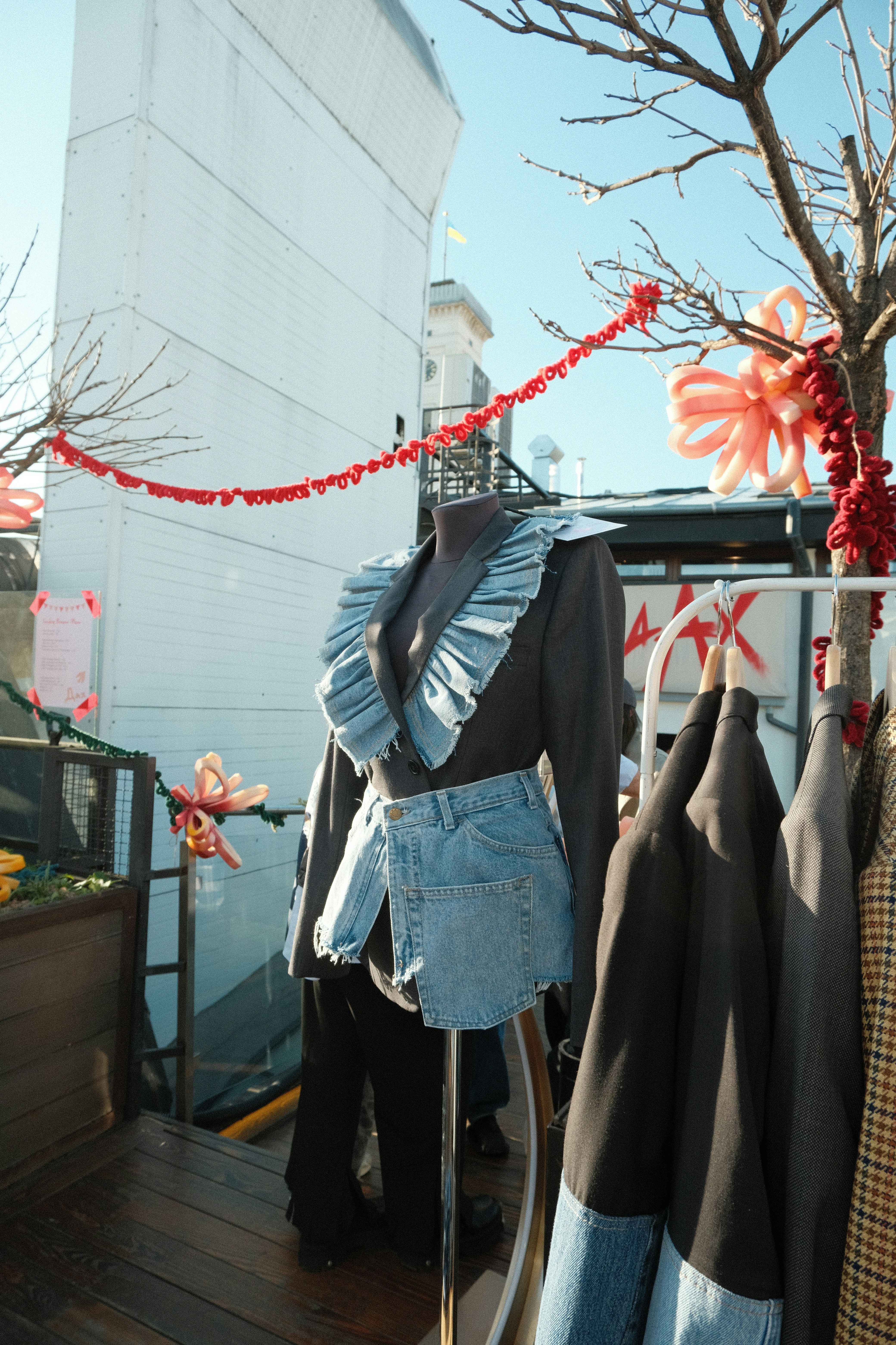 Rooftop Boutique: Denim Curves on a Mannequin