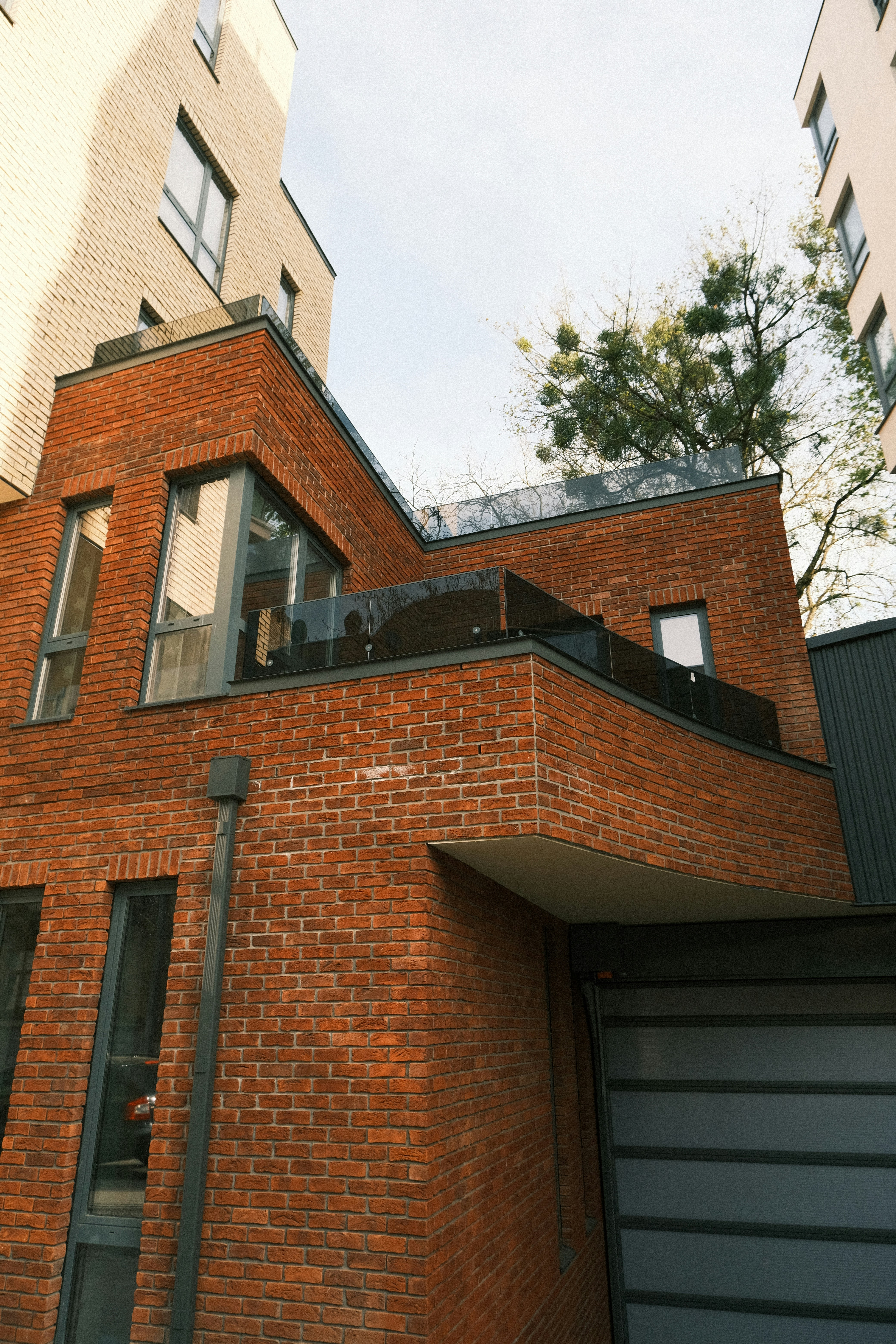 Modern brick building with interesting architectural design. photo ...