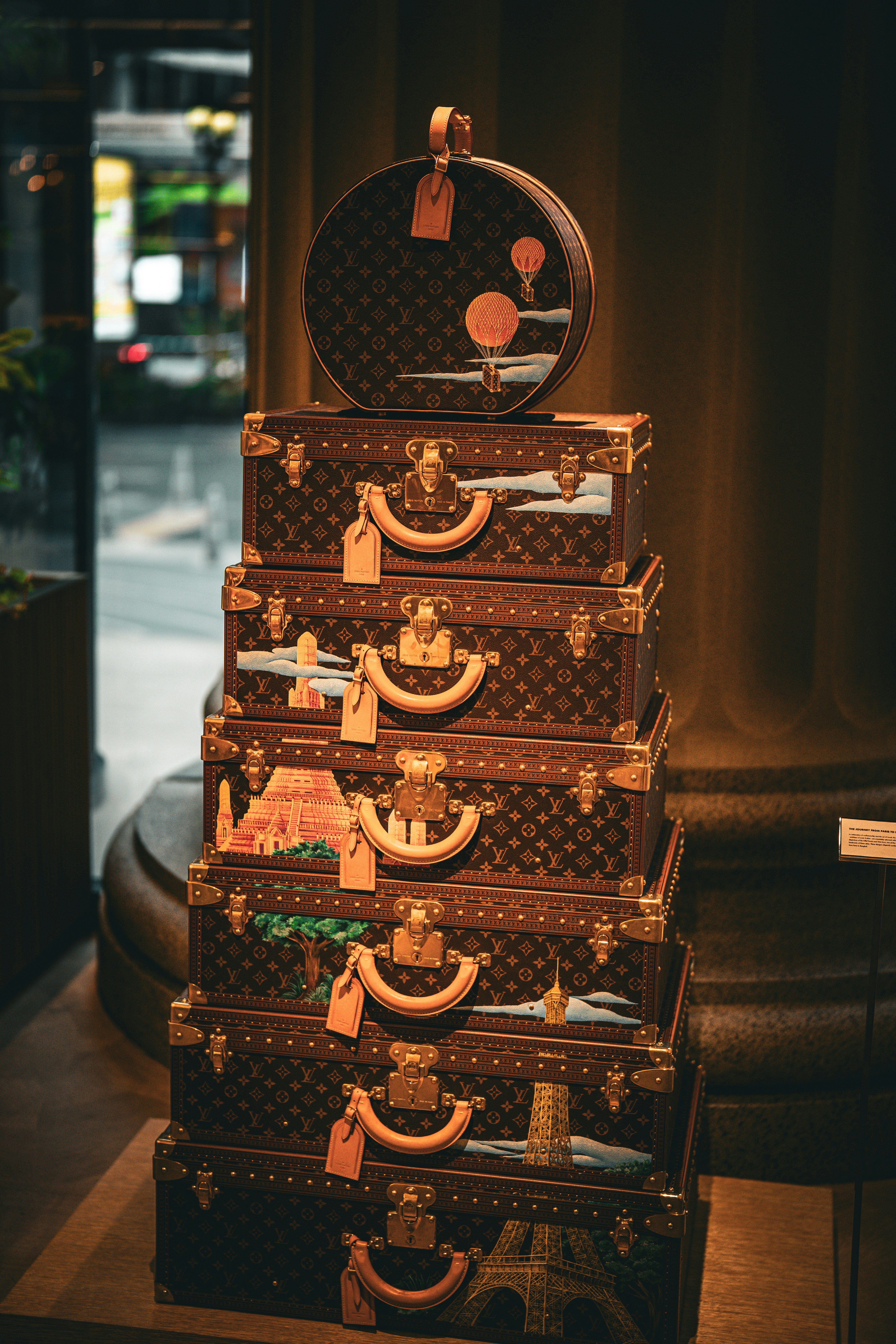 Stacked, decorative louis vuitton luggage displays its artistry. photo ...