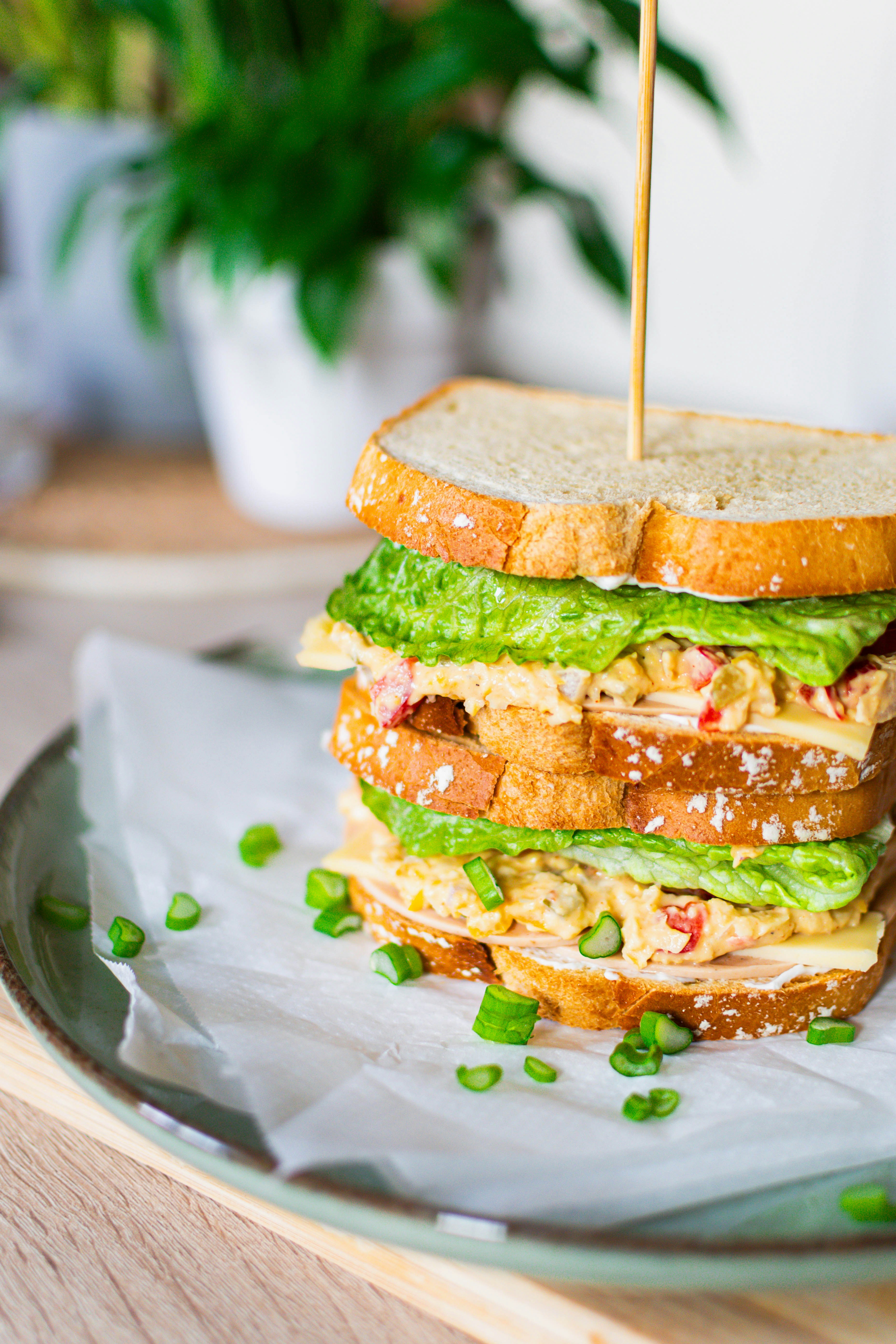A delicious, stacked sandwich is ready to eat. photo – Free Breakfast ...