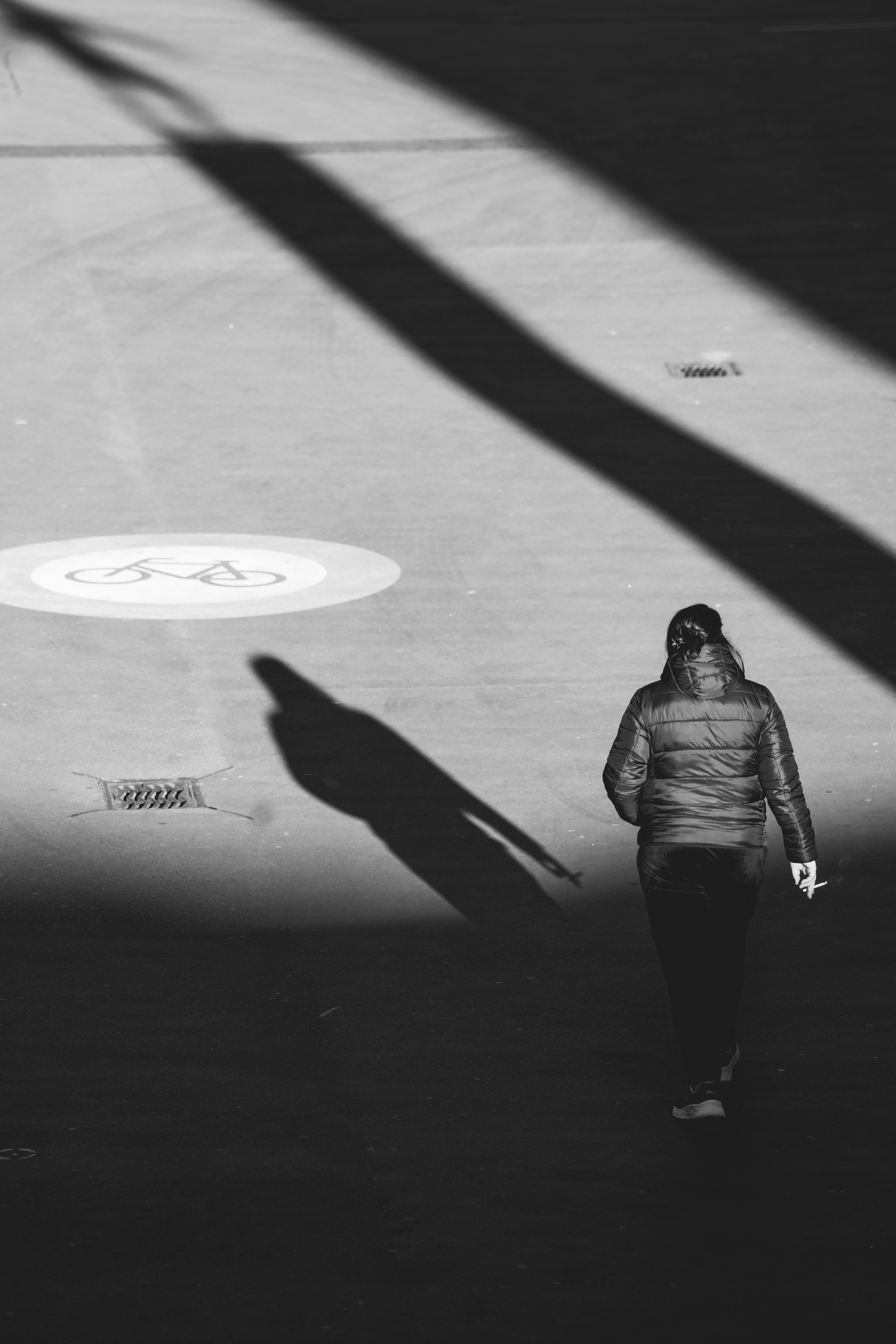 A woman walks in shadow. photo – Free Portrait Image on Unsplash