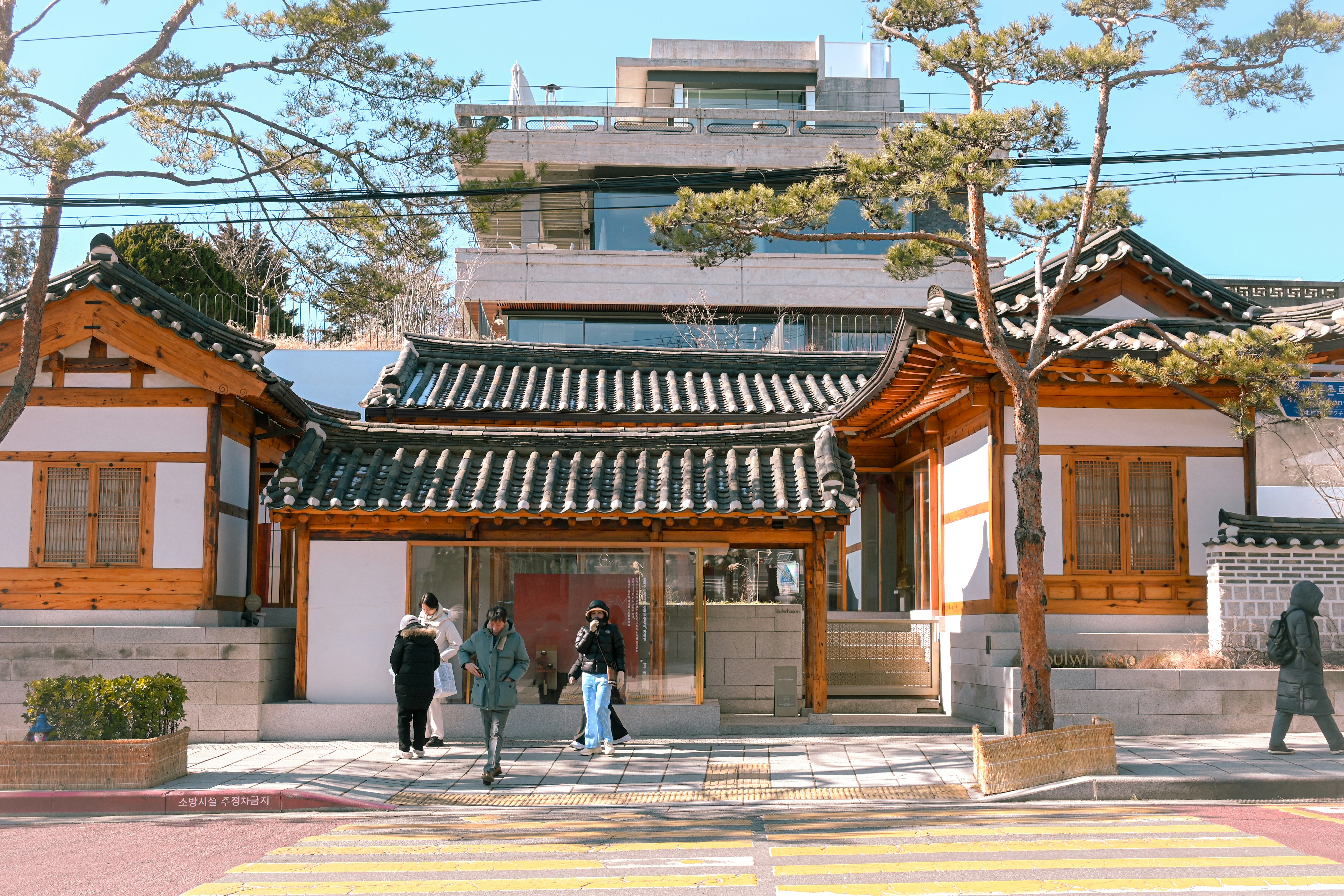 Traditional korean buildings with people walking by. photo – Free Human ...