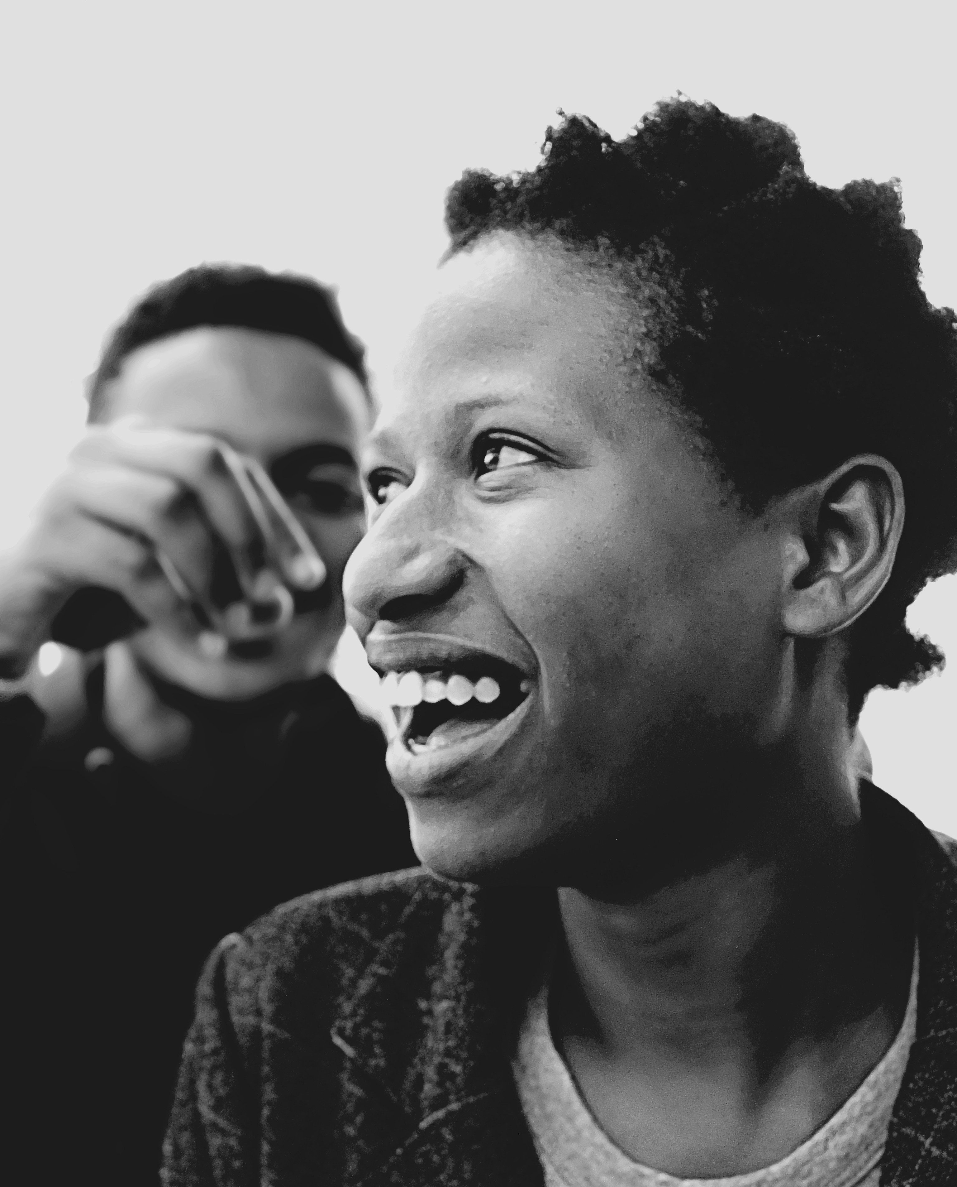The woman is laughing while a man whispers. photo – Free Portrait Image ...