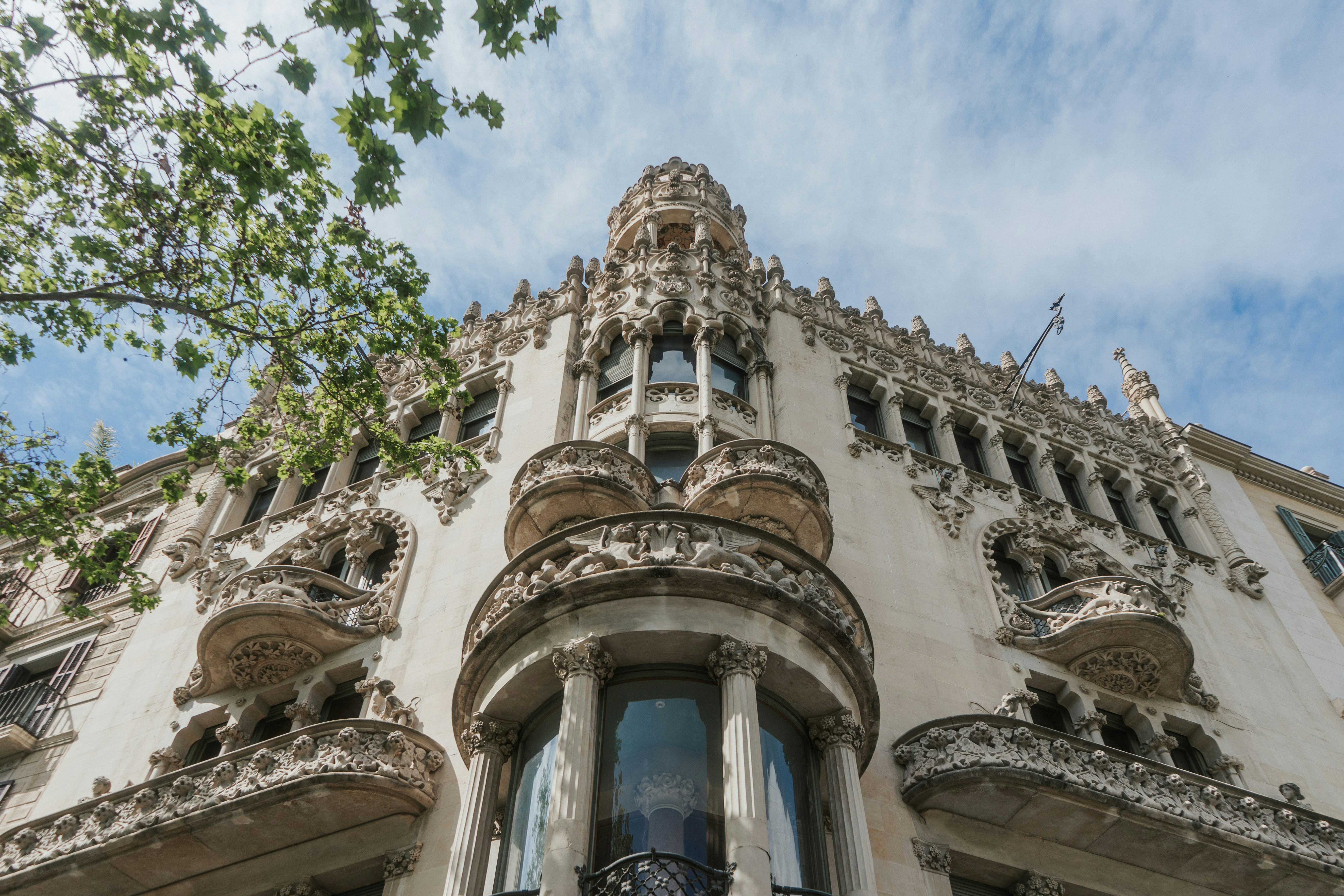 An ornate, detailed building stands against the sky. photo – Free ...