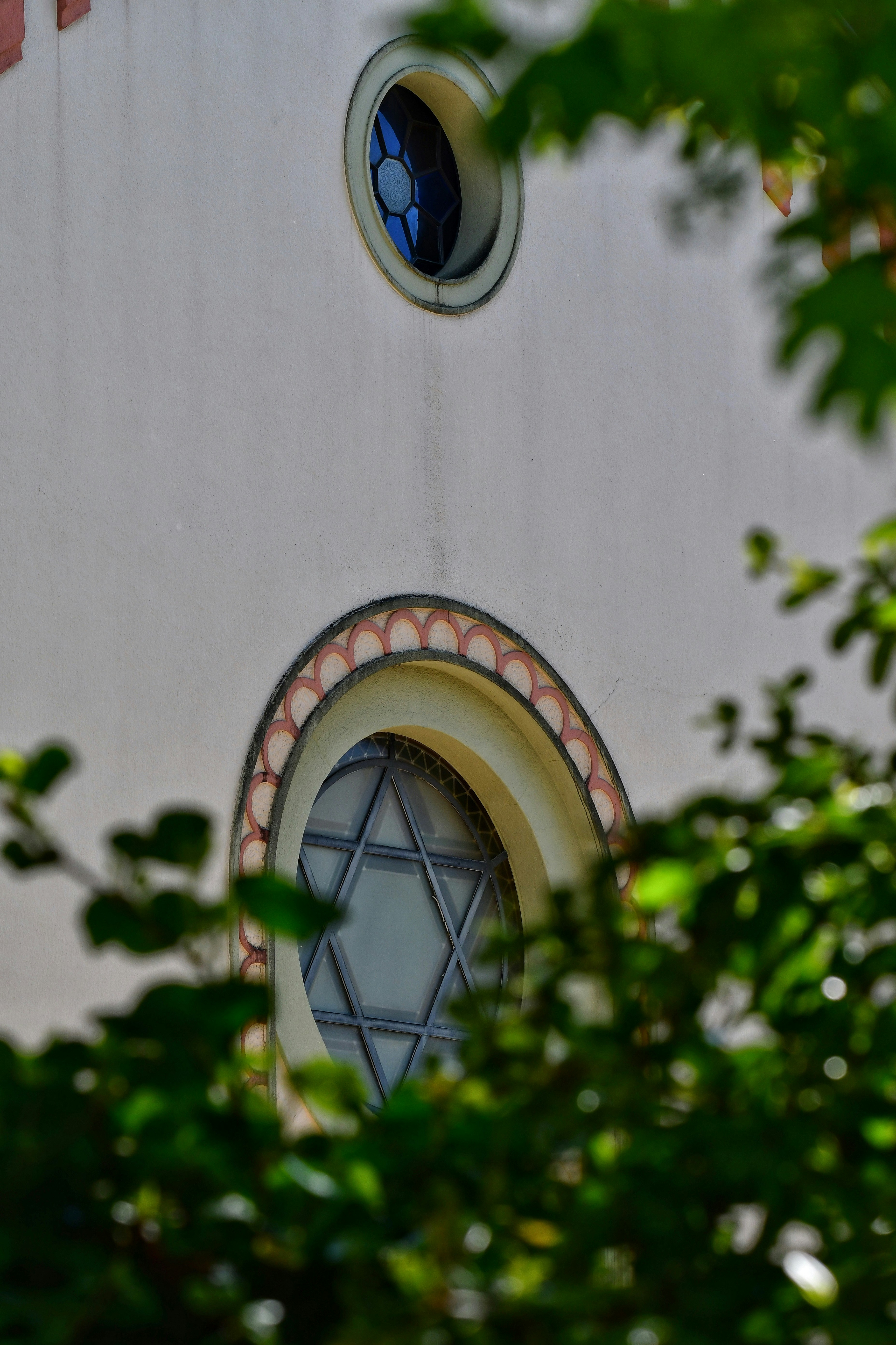 A building with star of david windows is shown. photo – Free Building ...