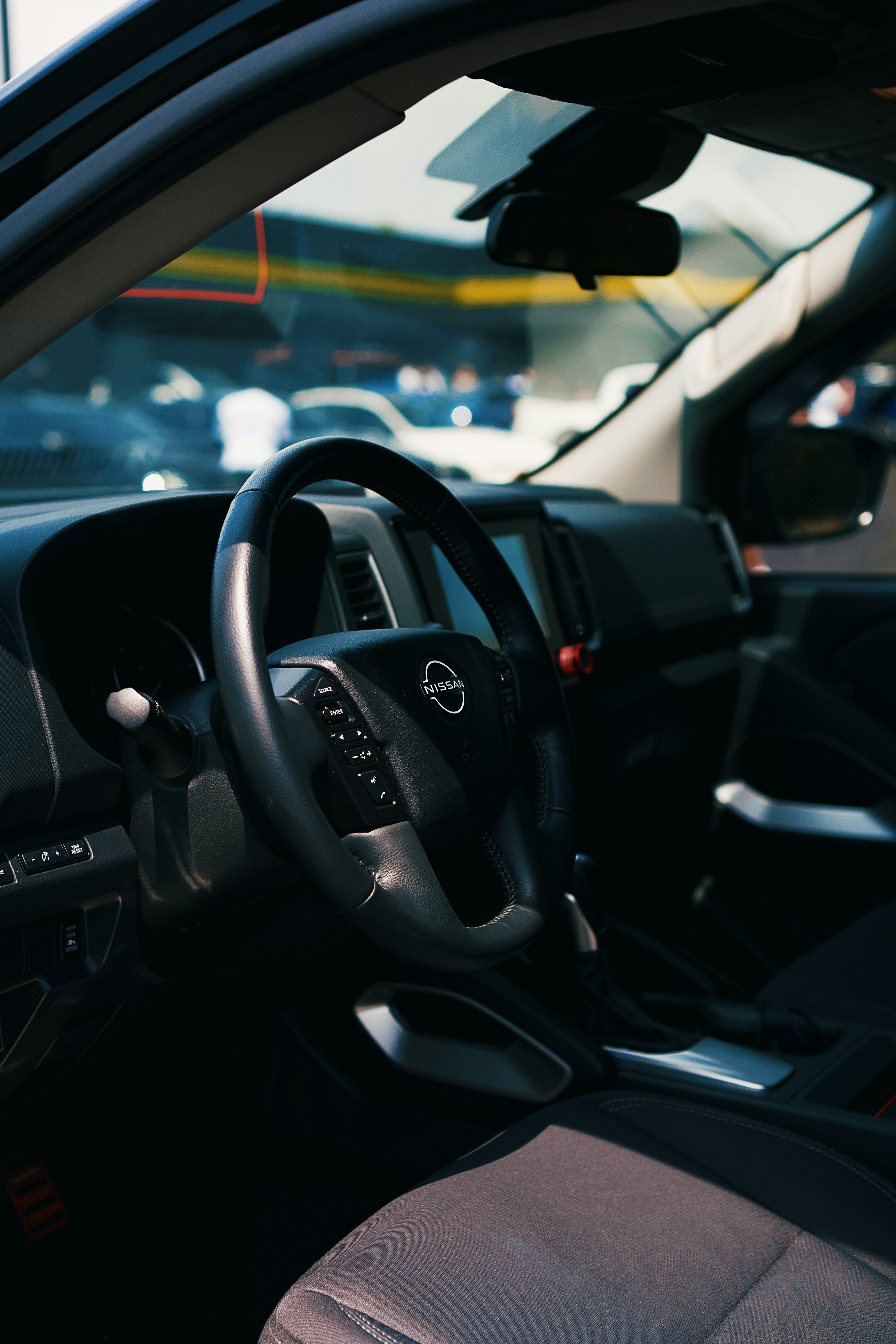 The interior of a nissan vehicle is shown. photo – Free Car Image on ...