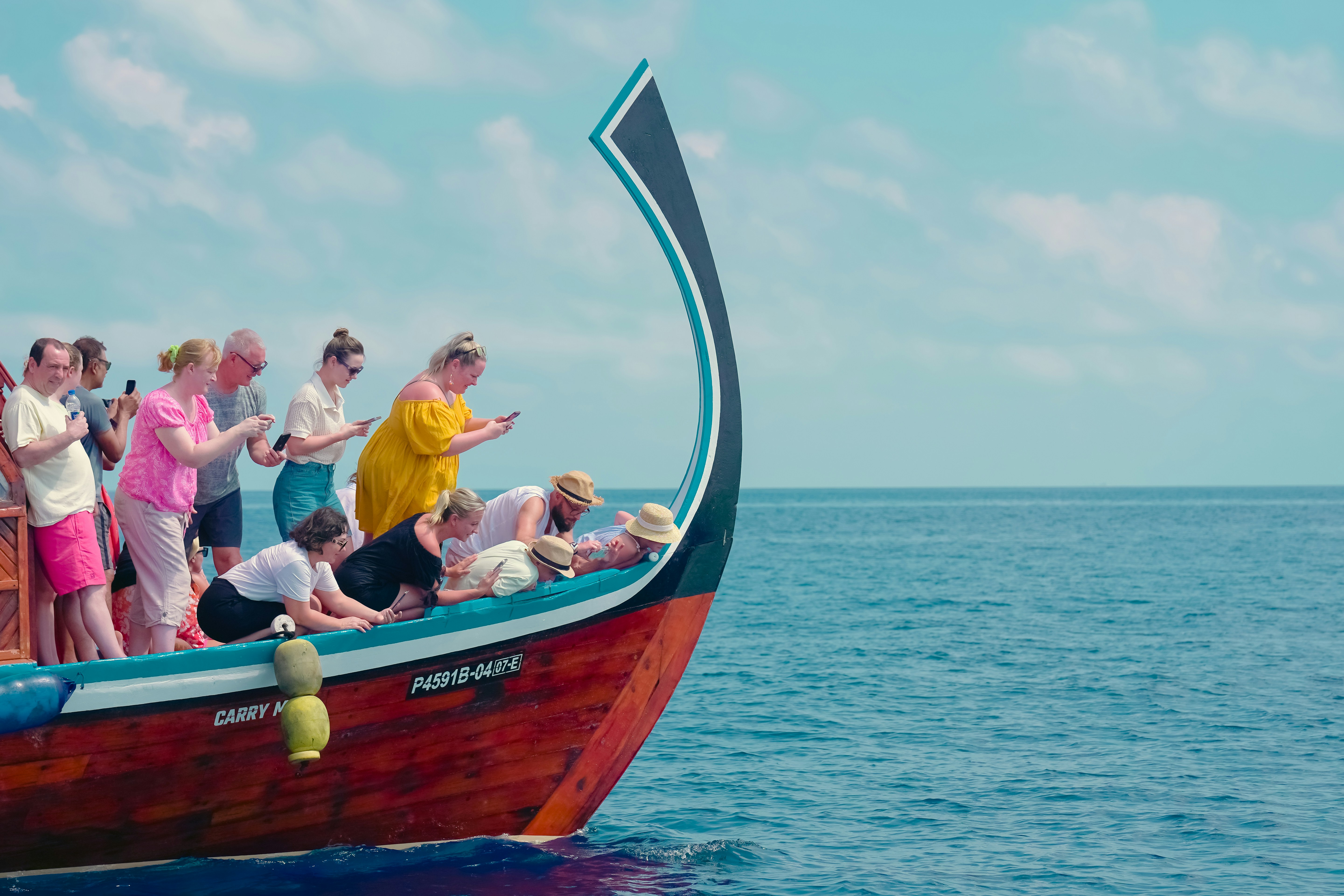 Crowded Bowline: A Row of Sunglasses and Hats on a Turkish-Style Boat Slicing the Sea