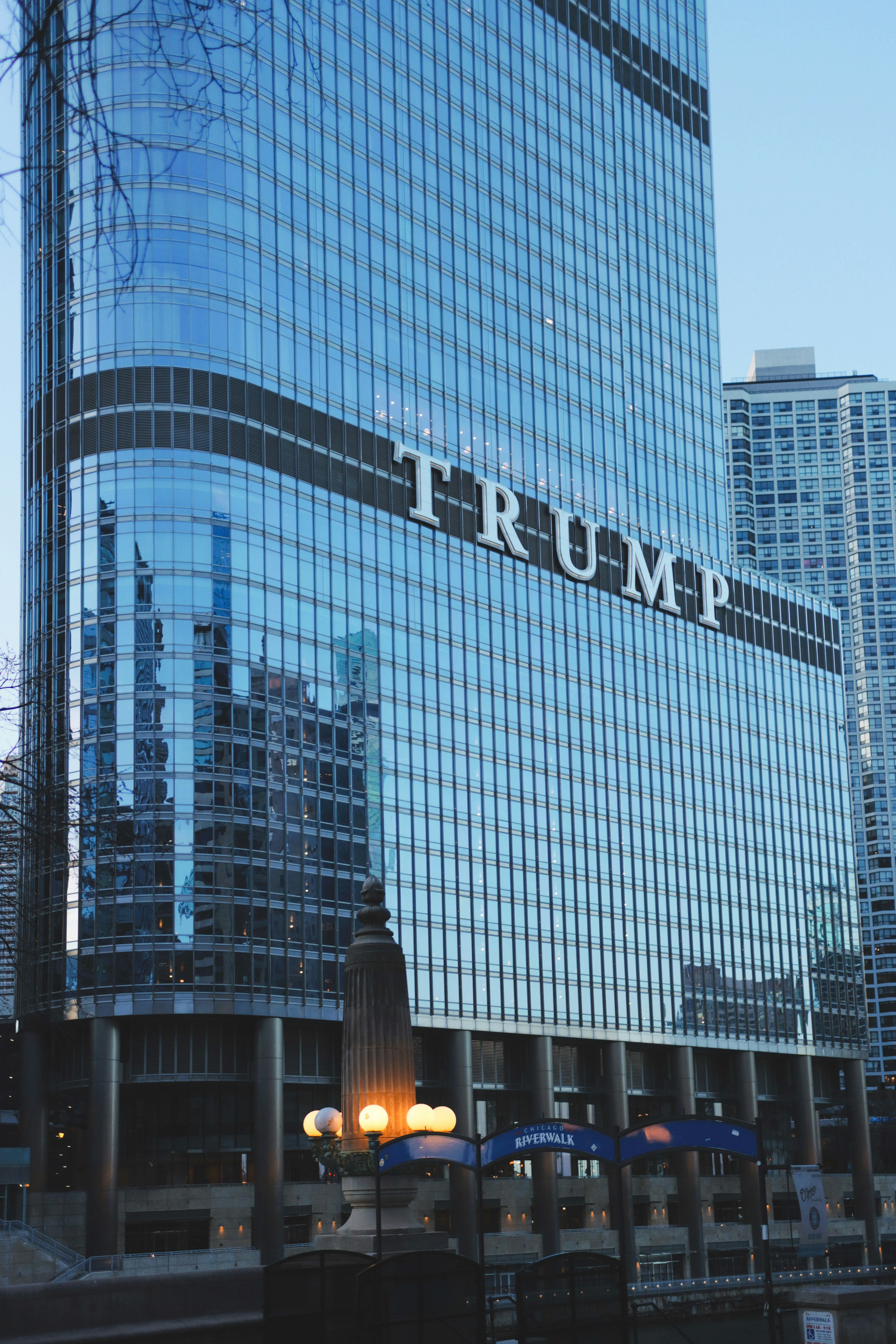 Trump Tower Reflections: A Glass Facade Crowned by a Bold Sign