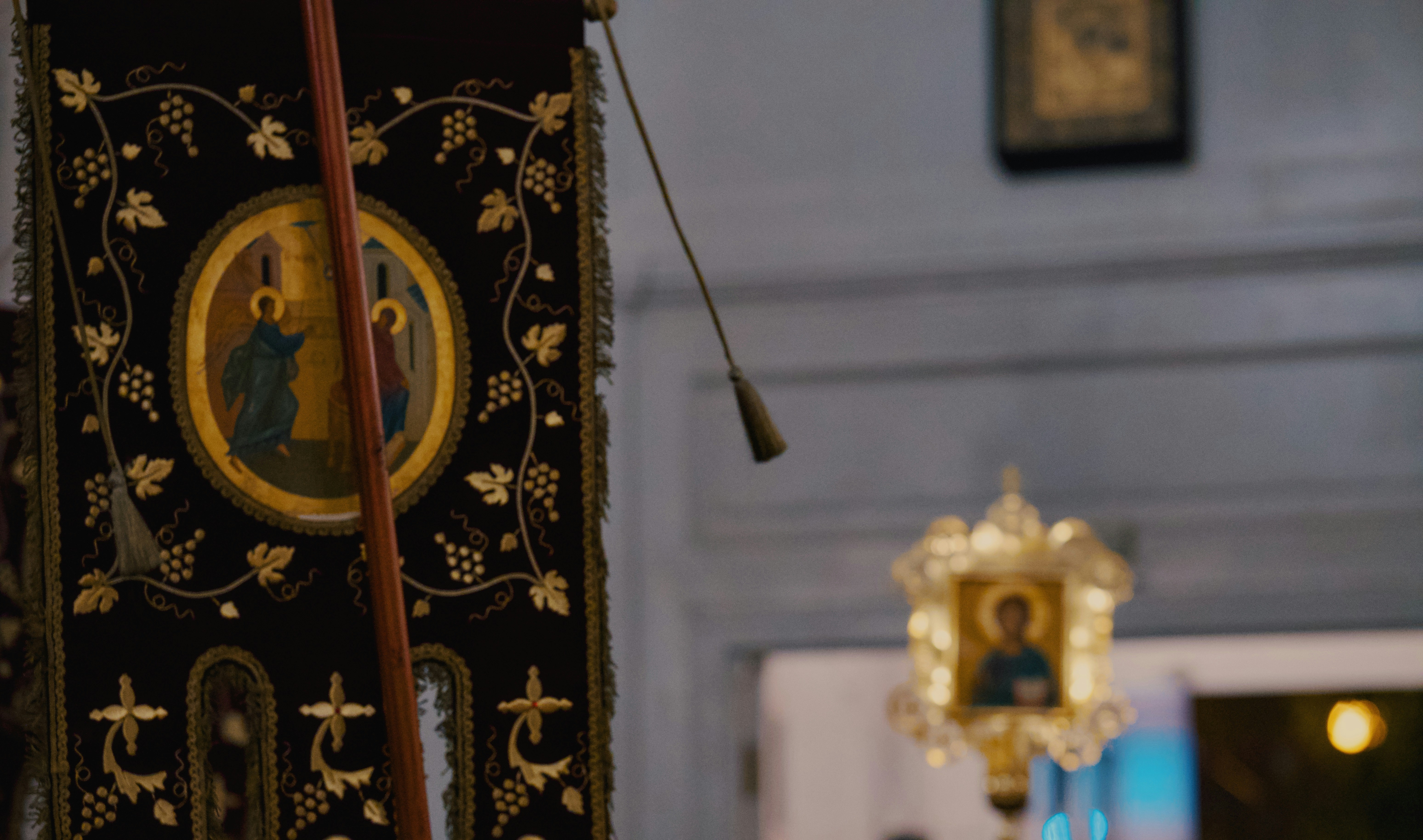 Religious banners and icons decorate a church interior. photo – Free ...